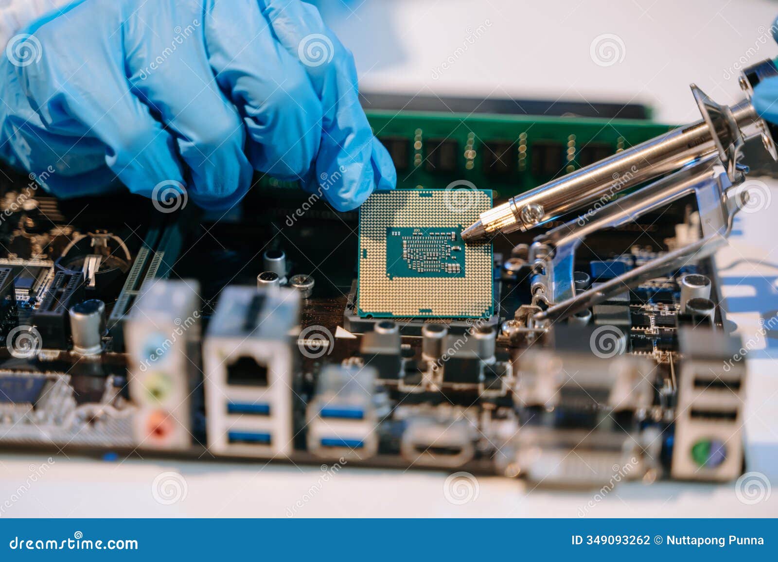 The Technician is Putting the CPU on the Socket of the Computer ...