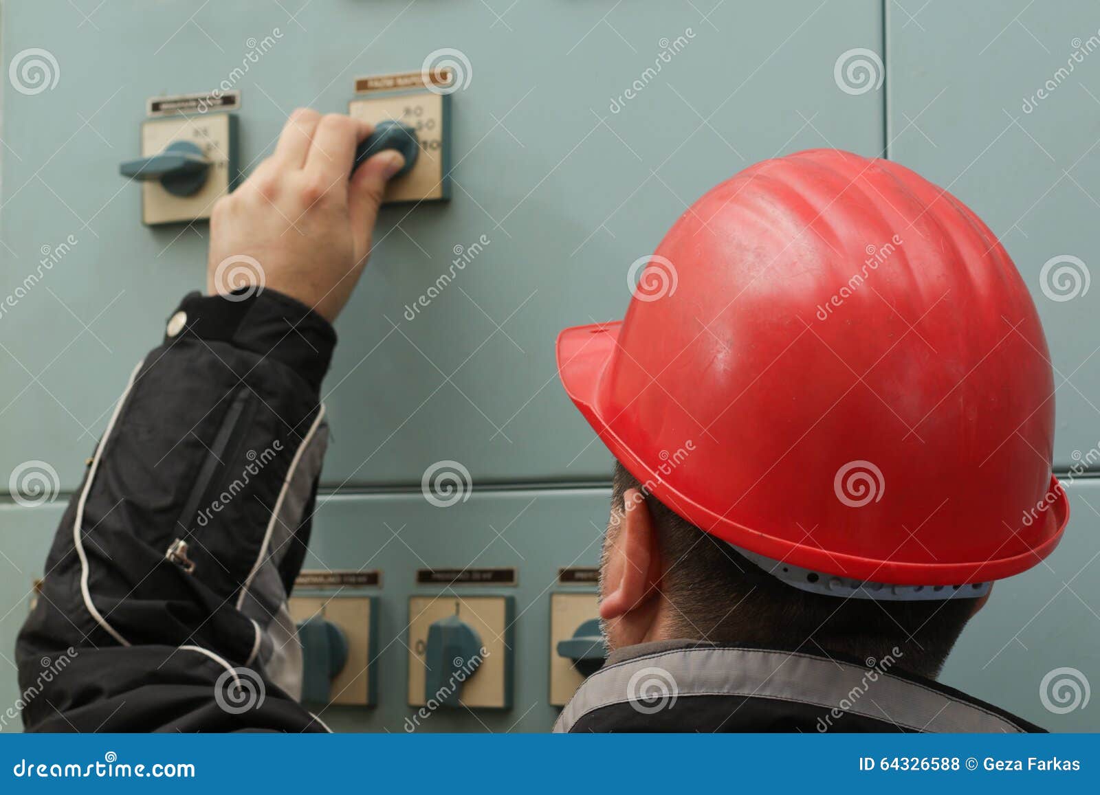 Technician with Red Helmet Turn Off the Power Switch Stock Photo ...