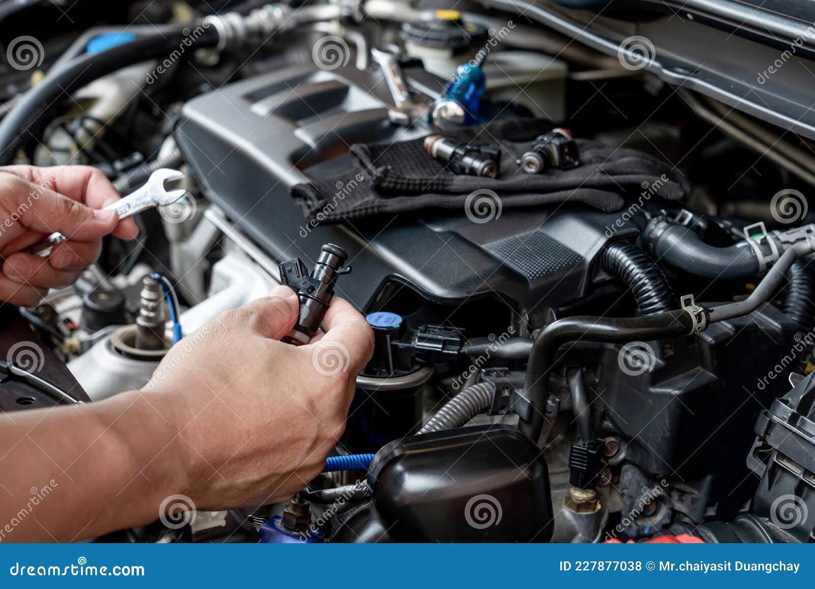 Technician Removing the Gasoline Injector Part in Engine Room Check ...