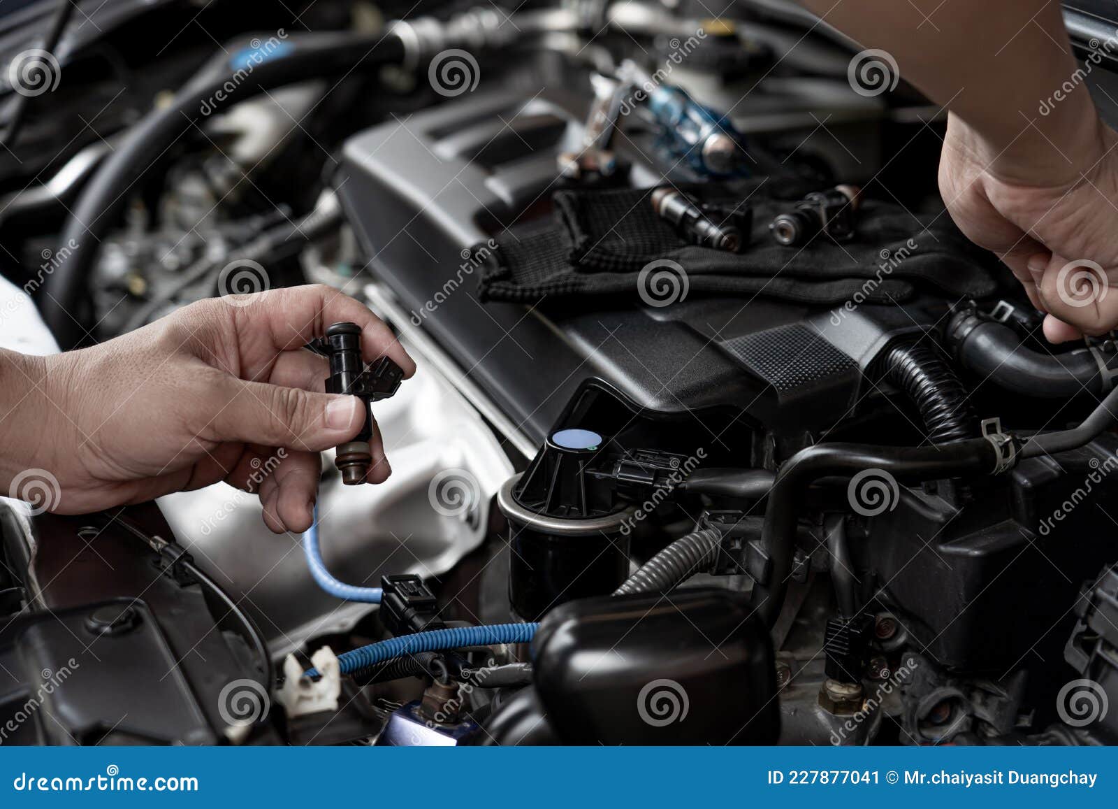 Technician Removing the Gasoline Injector Part in Engine Room Check ...