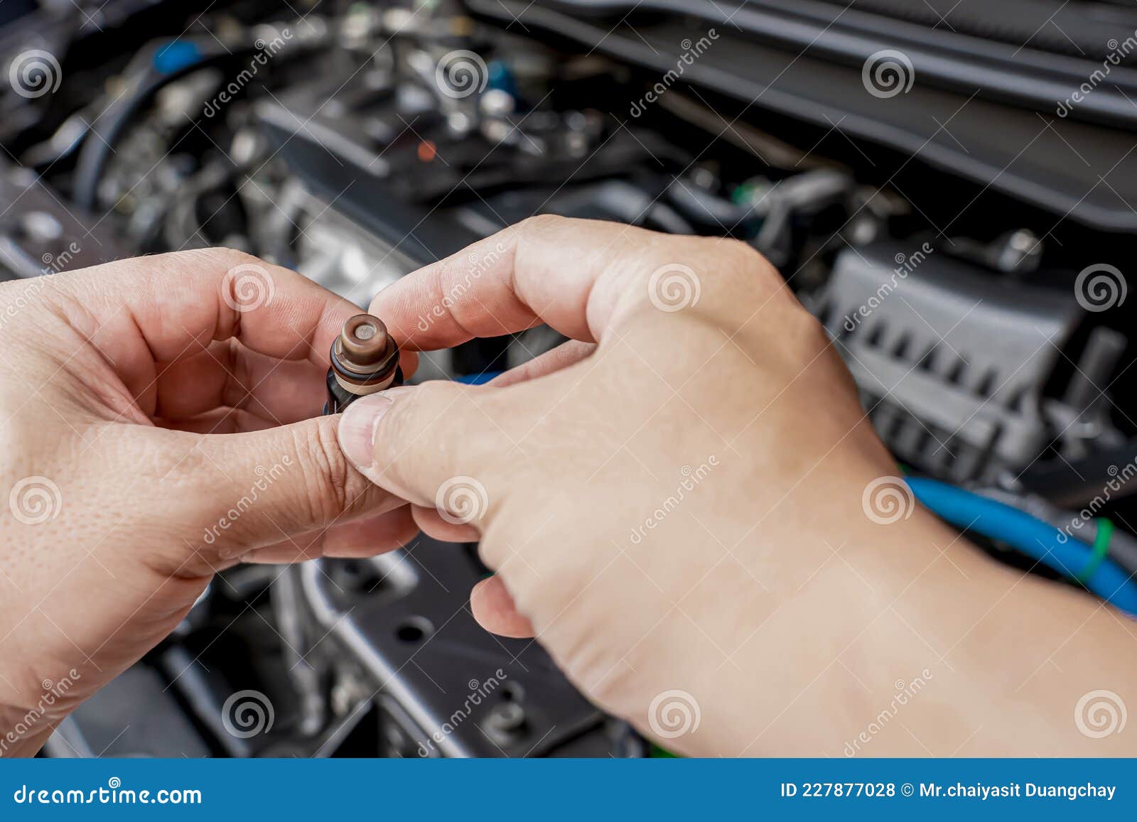 Technician Removing the Gasoline Injector Part in Engine Room Check ...