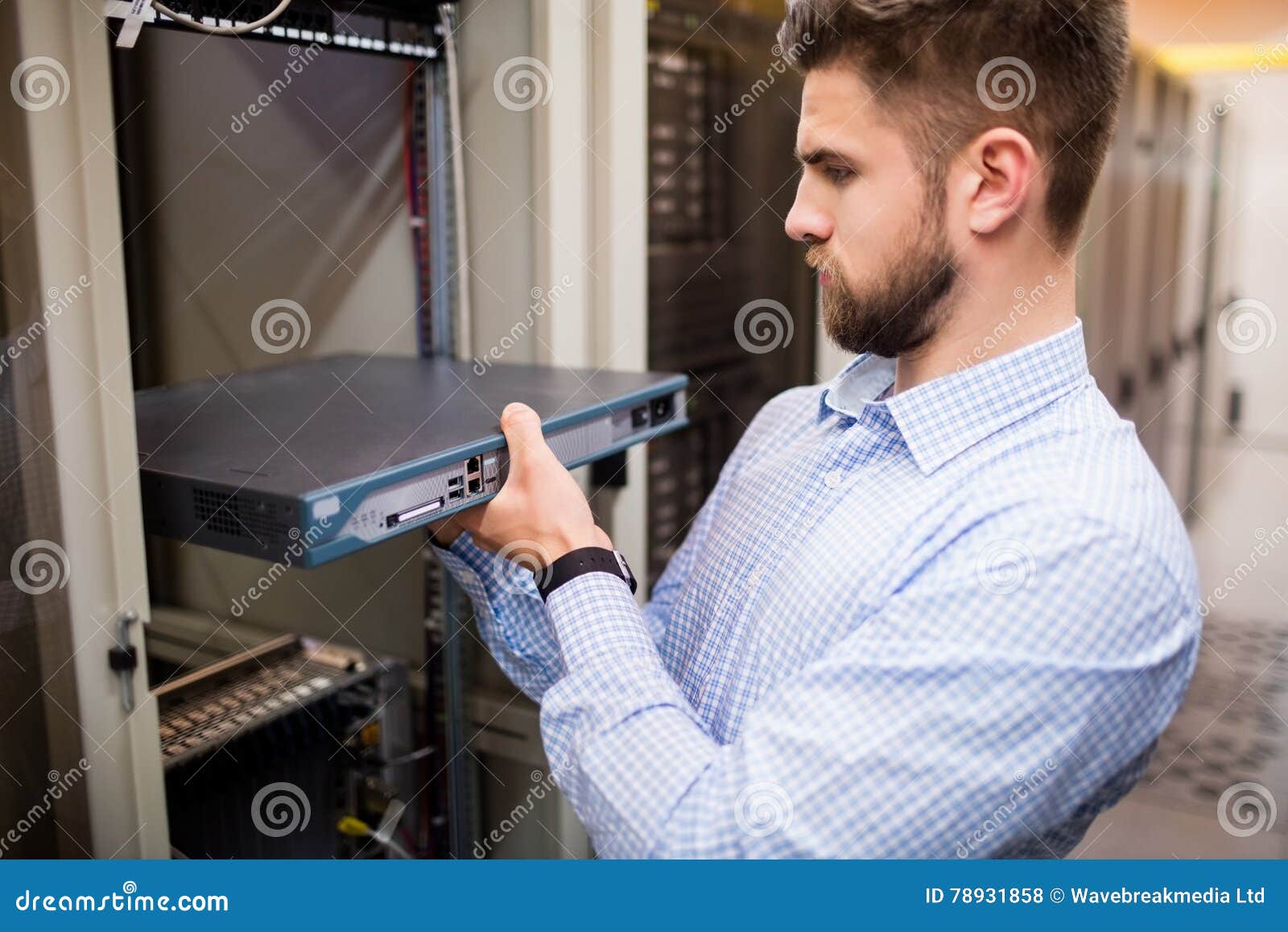Technician Removing Server from Rack Mounted Server Stock Photo - Image ...