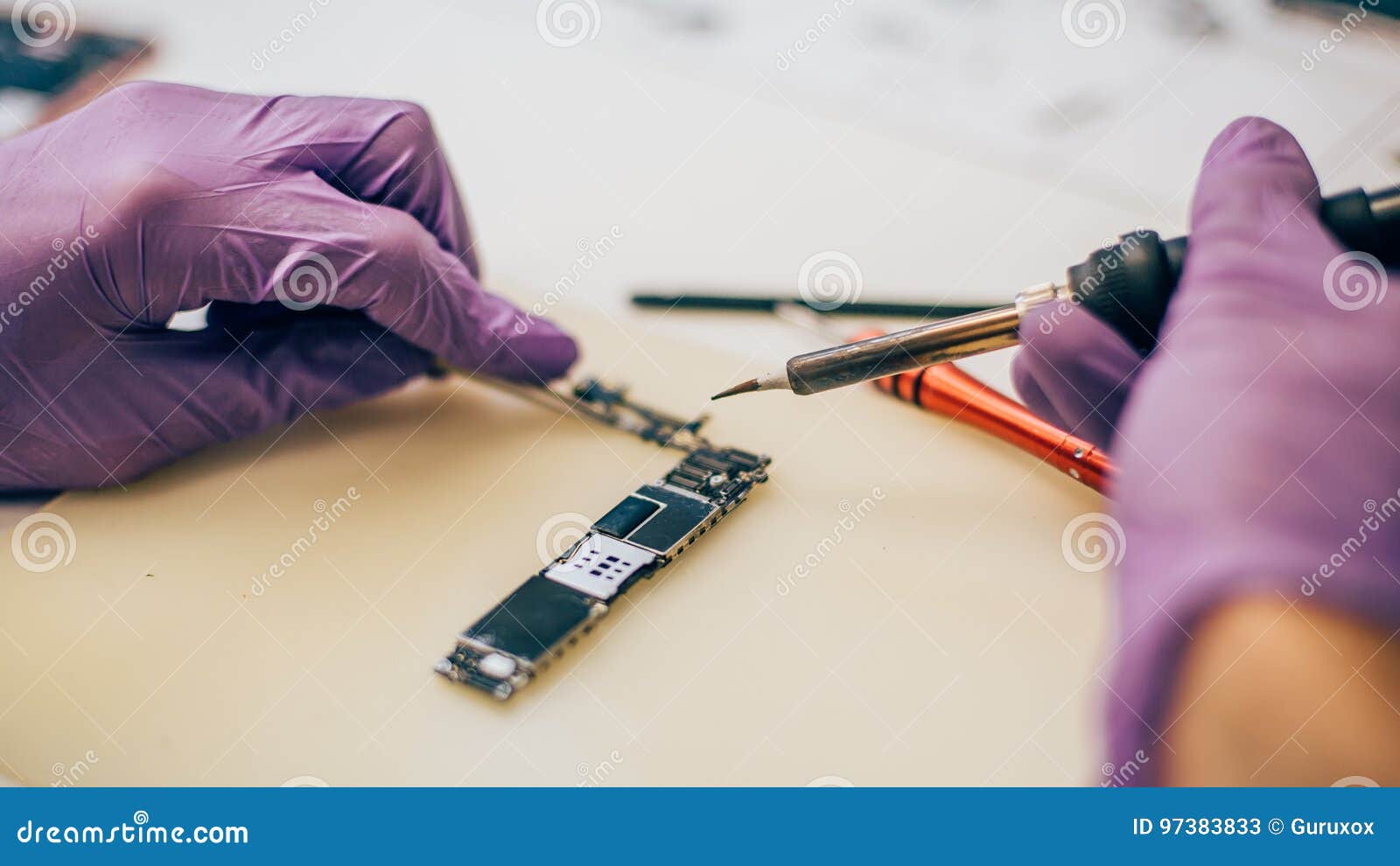 Technician Repair Microchip and Motherboard of Mobile Phone in E Stock ...