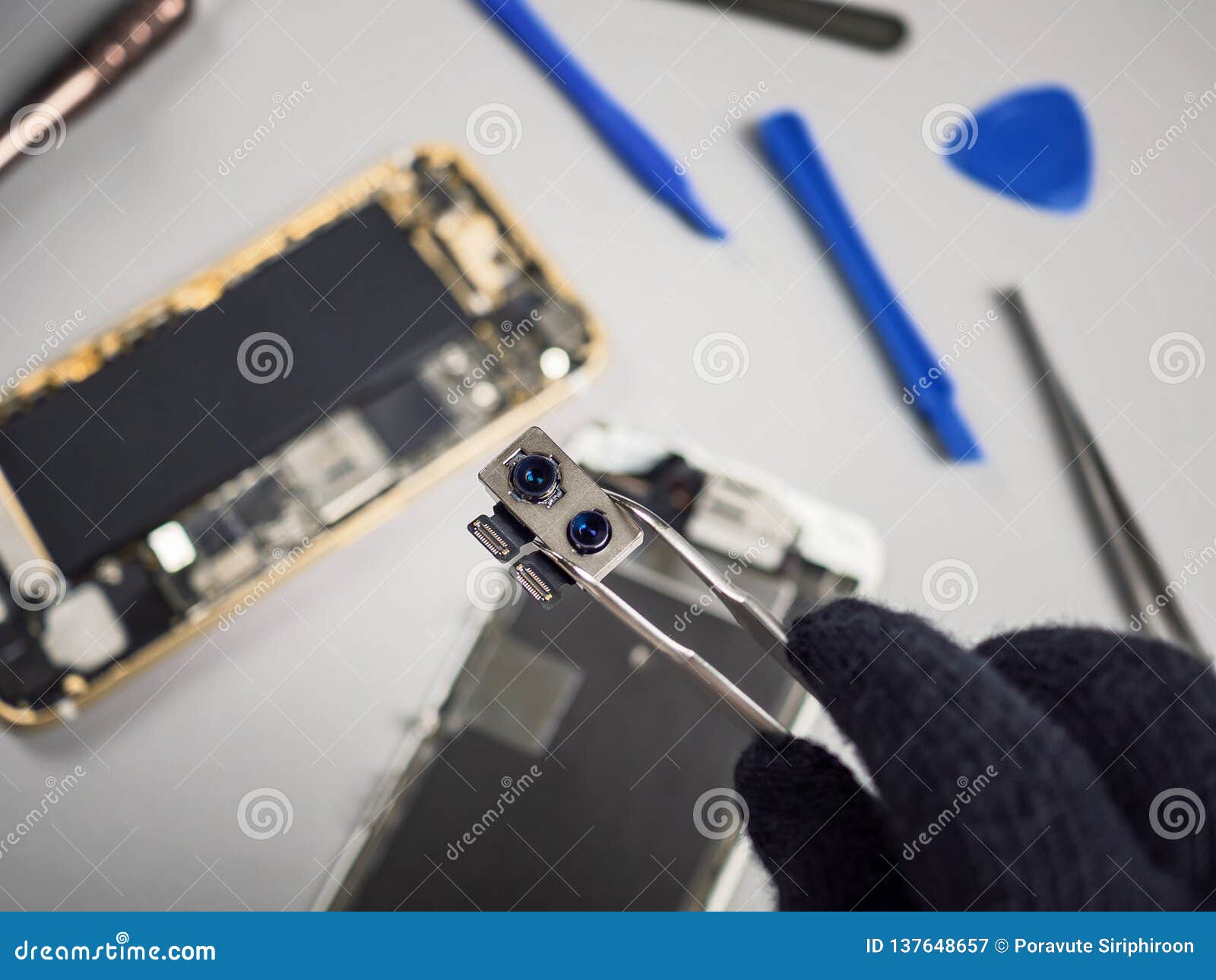 Technician Repairing Broken Smartphone on Desk Stock Image - Image of ...
