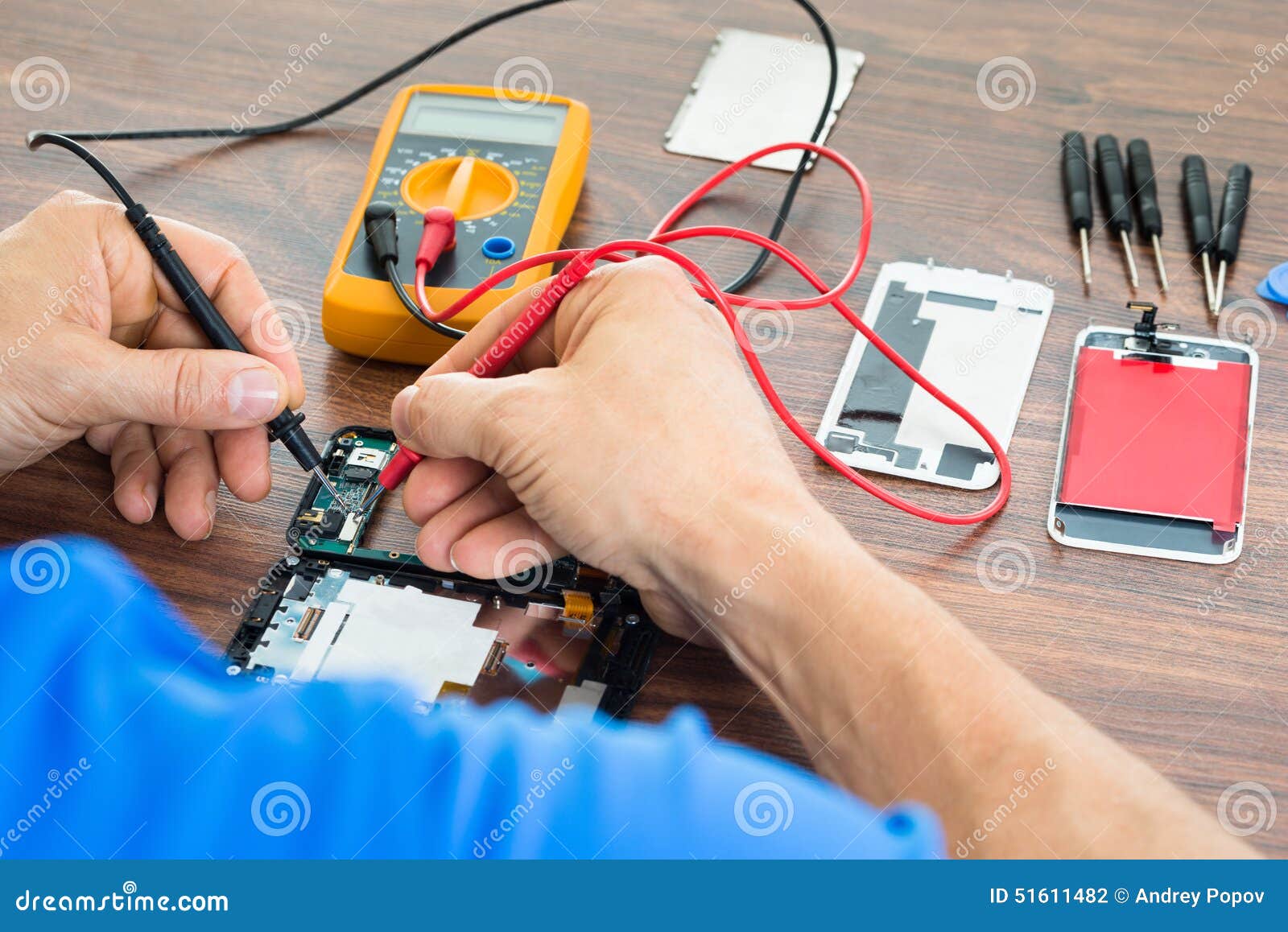 Technician Repairing Cellphone with Multimeter Stock Photo - Image of ...