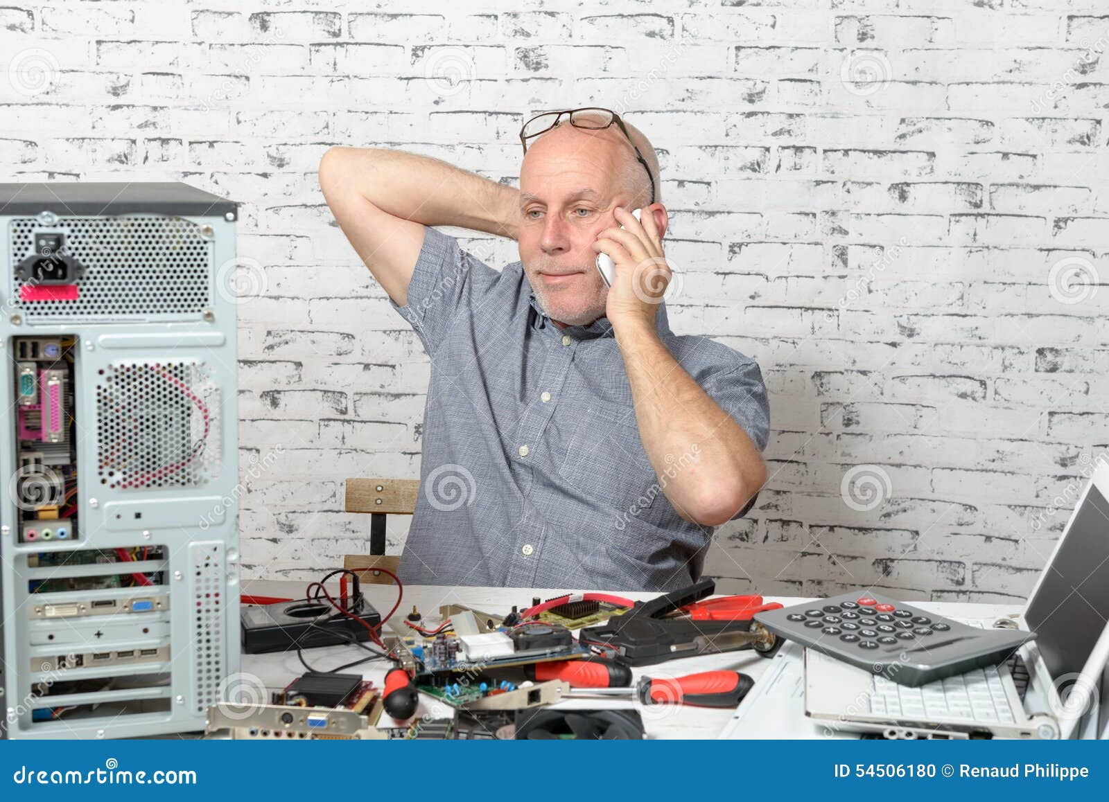 A Technician Repairing a Computer Stock Photo - Image of electronics ...