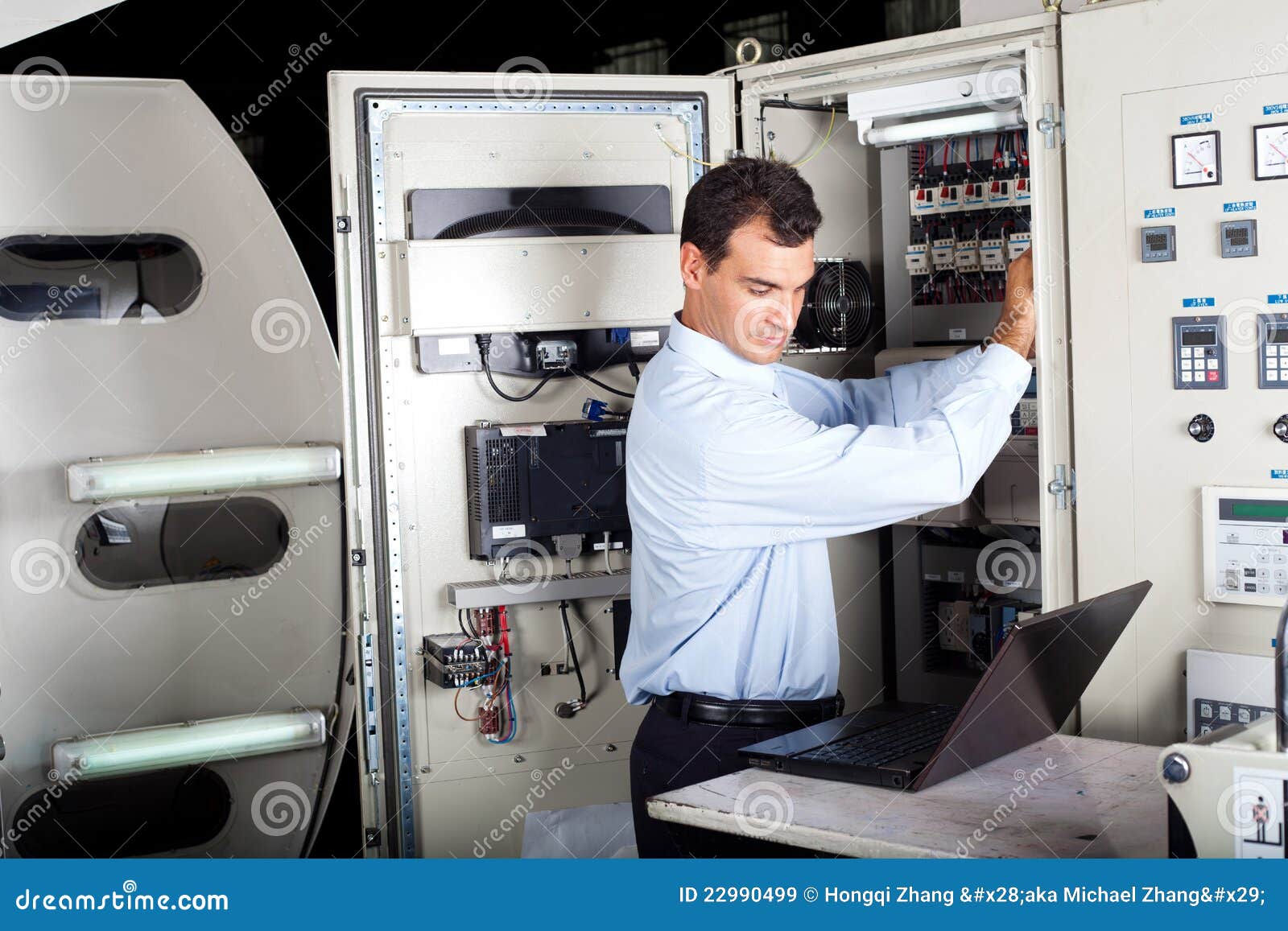 Technician Repairing Computerized Machine Stock Image - Image of cable ...