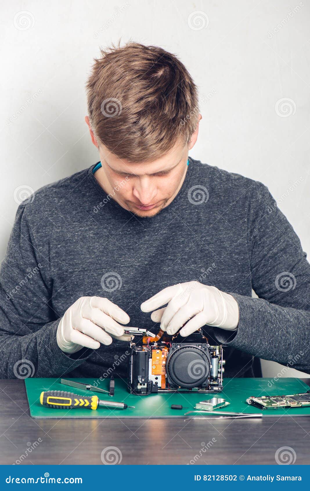 Technician Repairing Digital Camera Stock Photo - Image of circuit ...