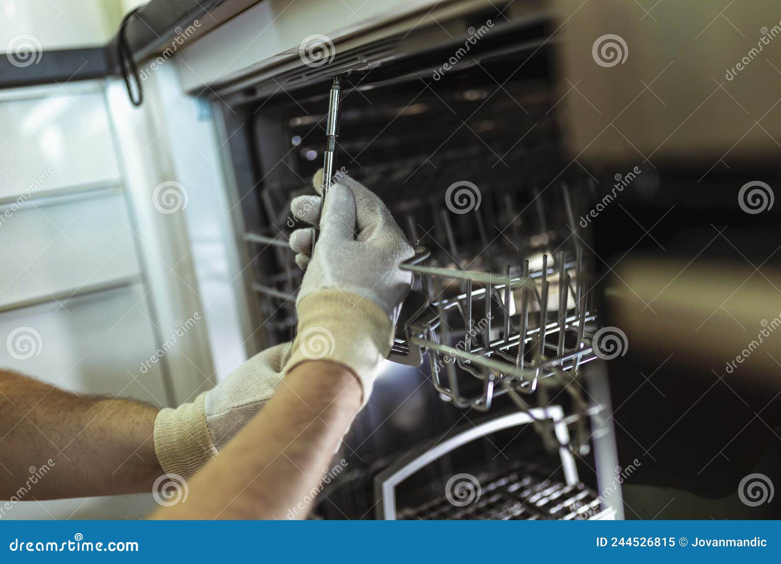 Technician Repairing Dishwasher in Kitchen, Close Up Stock Image ...
