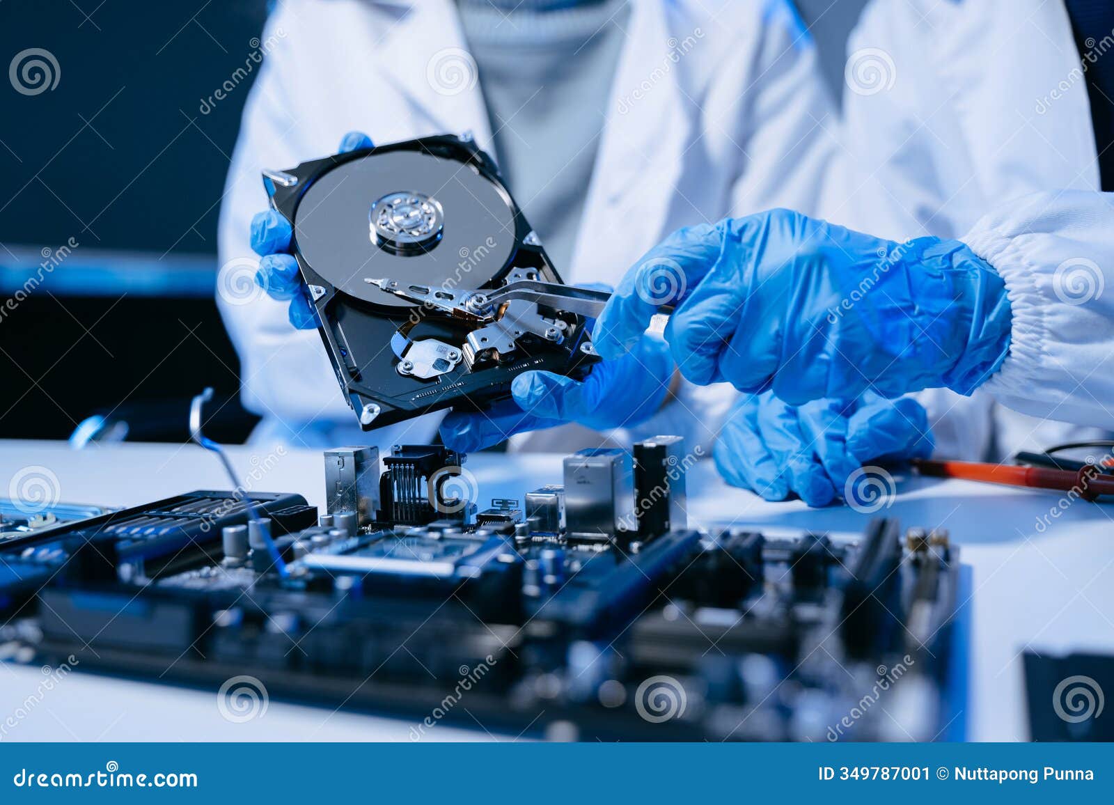 Technician Repairing Inside of Hard Disk Drive by Screwdriver. the ...