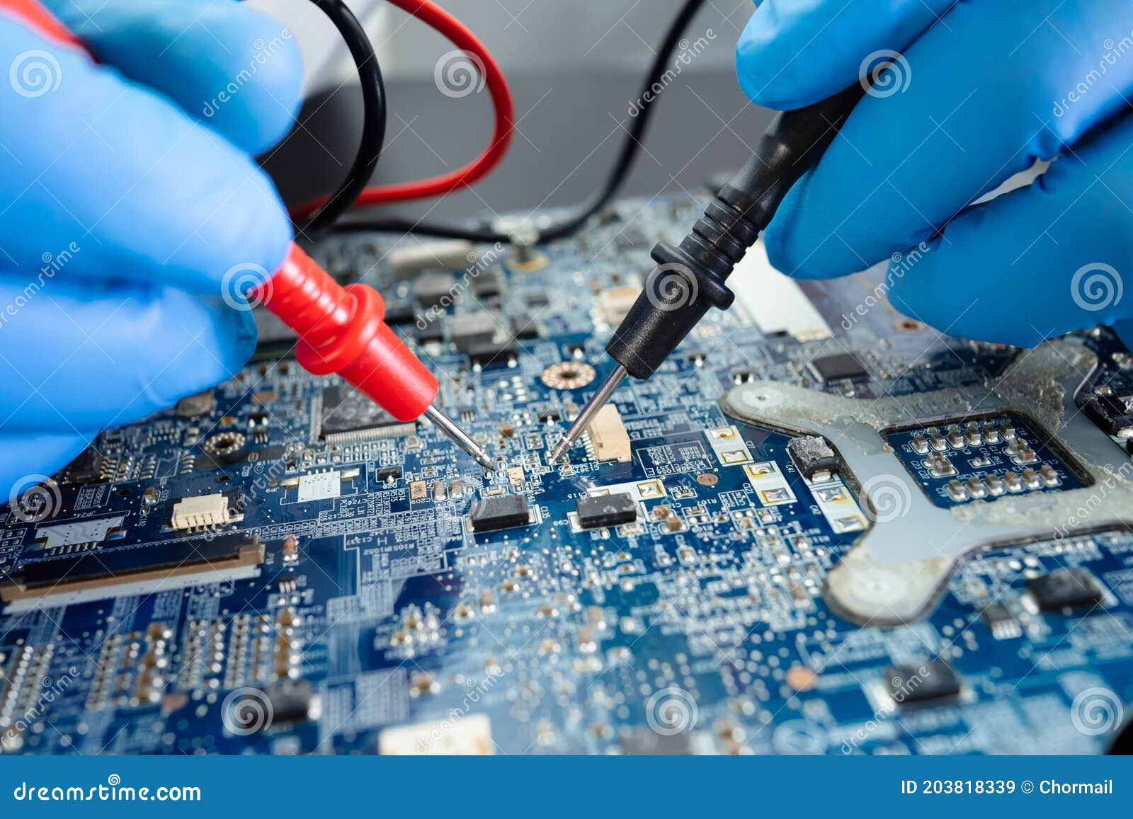 Technician Repairing Inside of Hard Disk by Soldering Iron. Integrated ...