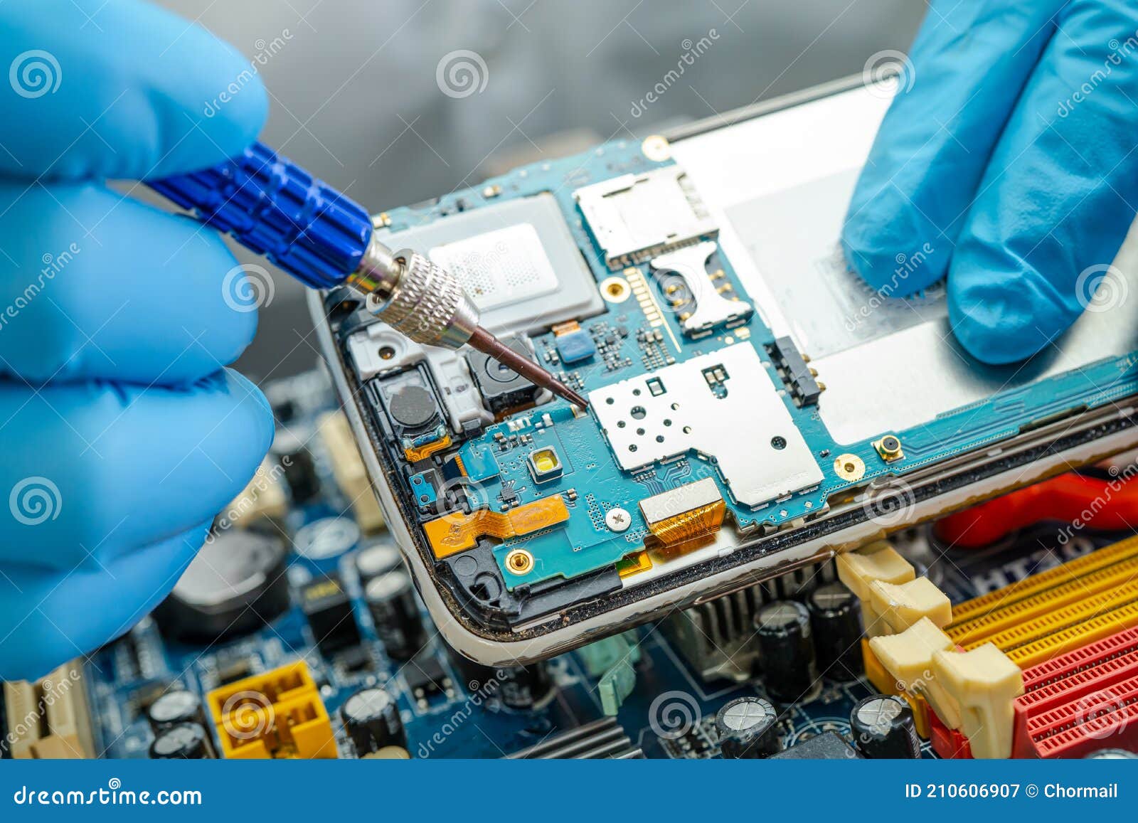Technician Repairing Inside of Hard Disk by Soldering Iron. Integrated ...