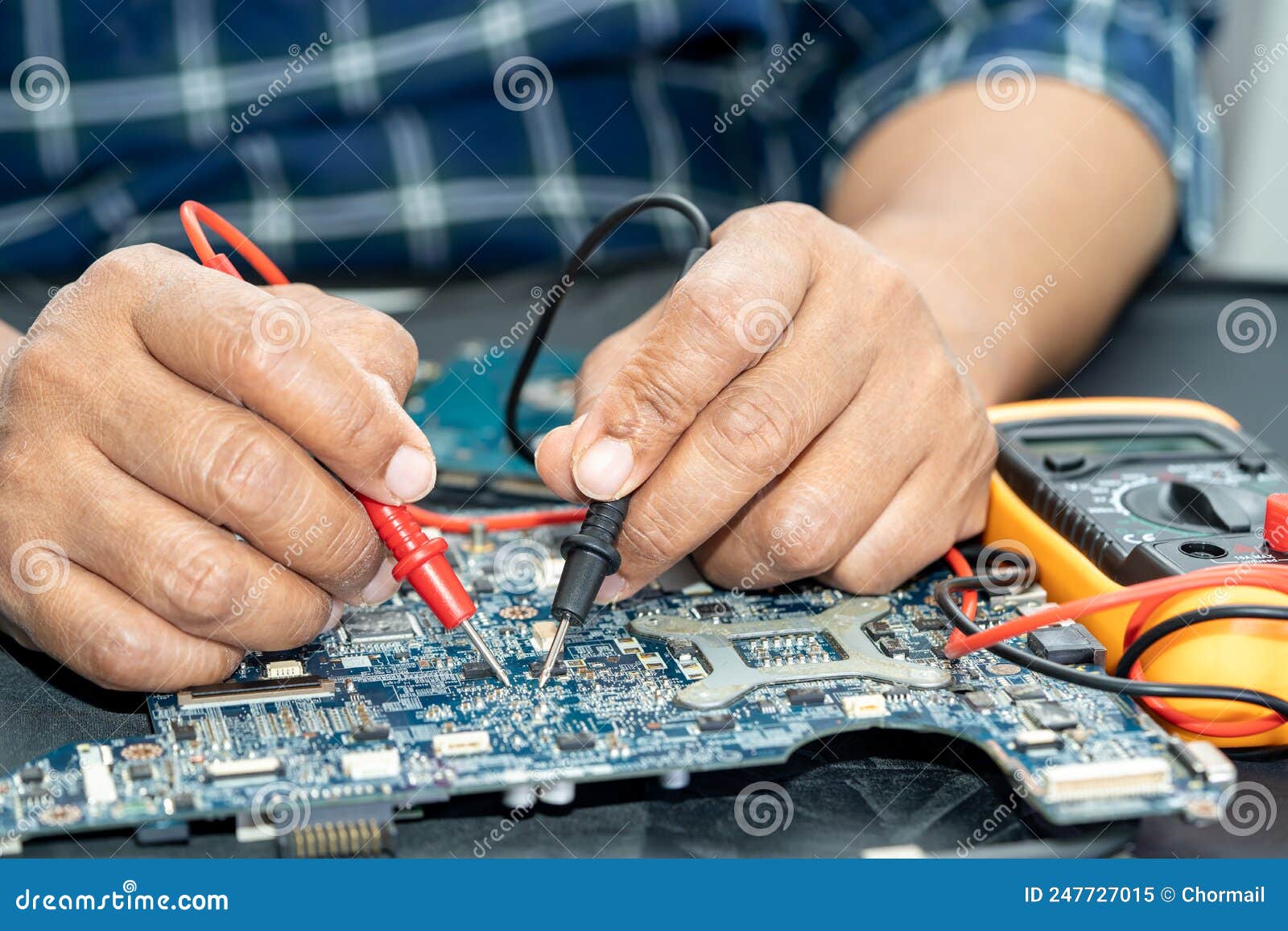 Technician Repairing Inside of Mobile Phone. Integrated Circuit. the ... Technician Repairing Inside of Mobile Phone. Integrated Circuit. the ...