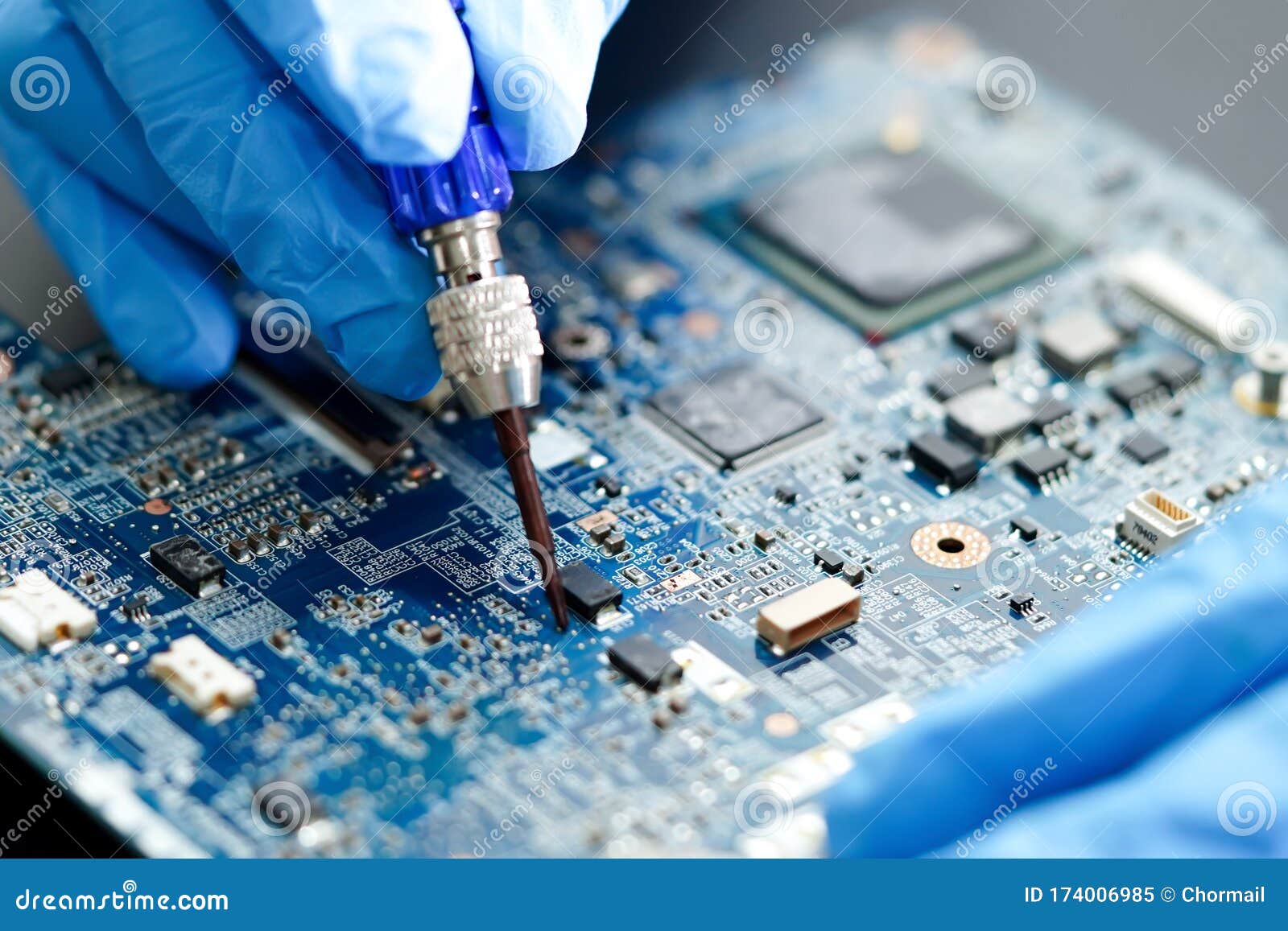 Technician Repairing Micro Circuit Main Board Computer Electronic ...