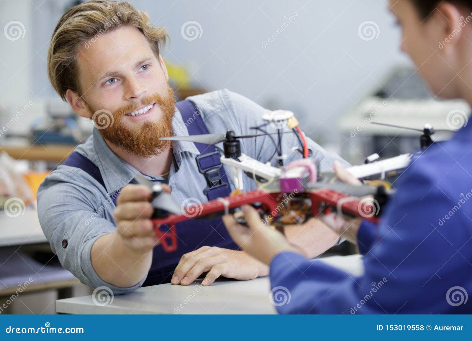 Technician Repairing Quadrocopter Drone Stock Photo - Image of table ...
