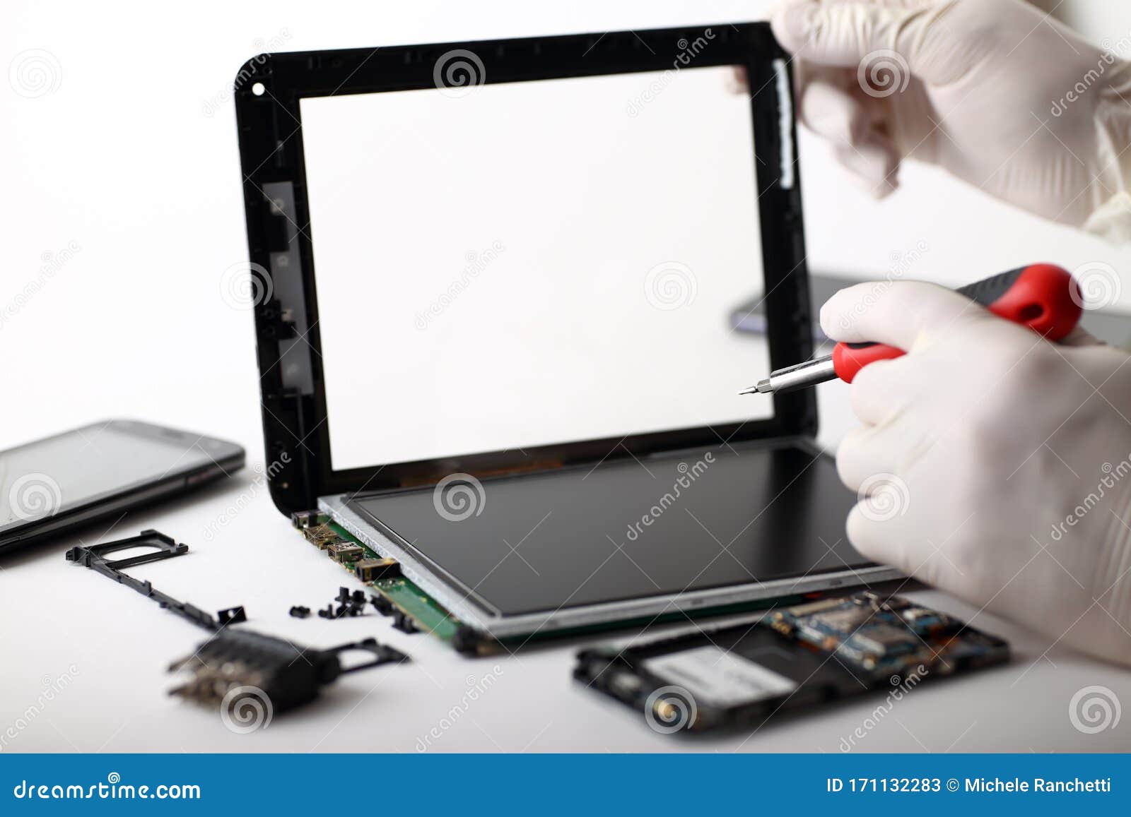 A Technician Repairs a Broken Tablet Stock Image - Image of device ...