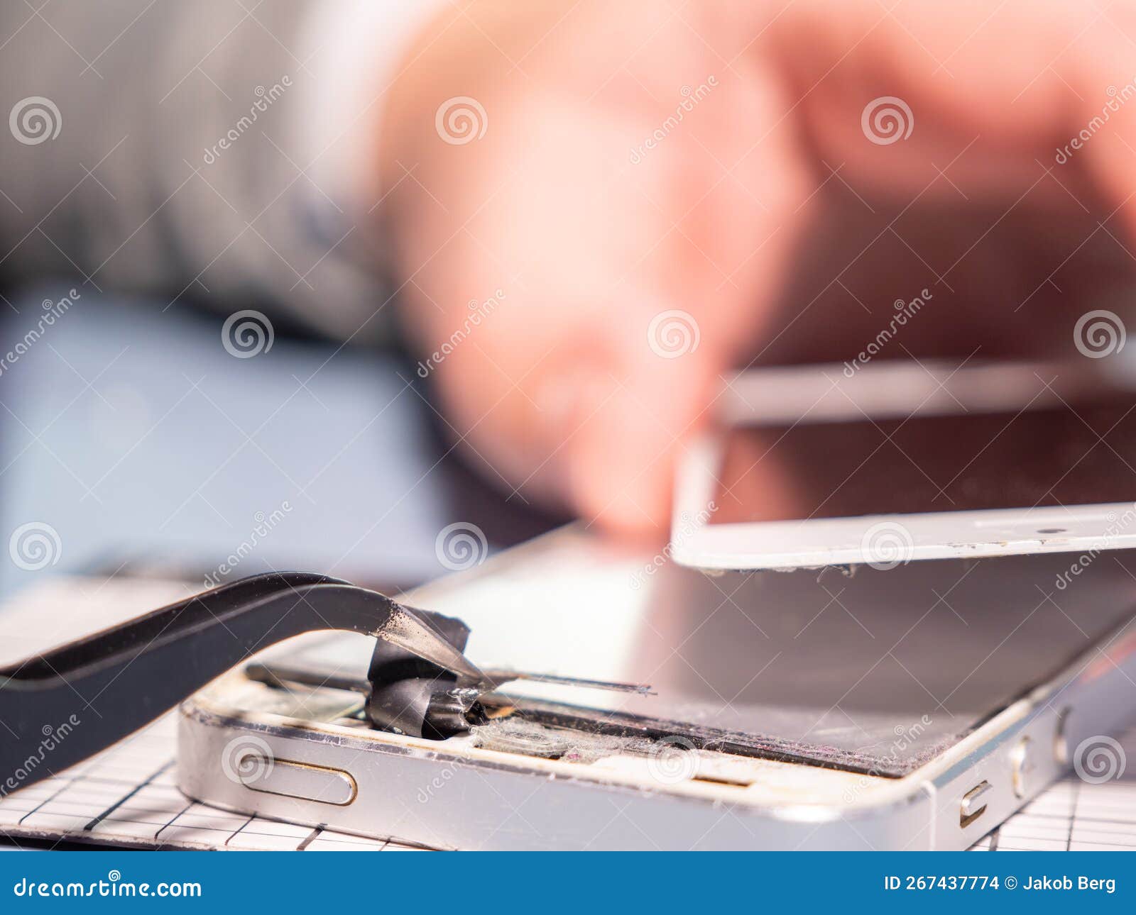 A Technician Repairs a Smartphone in a Laboratory with Copy Space ...