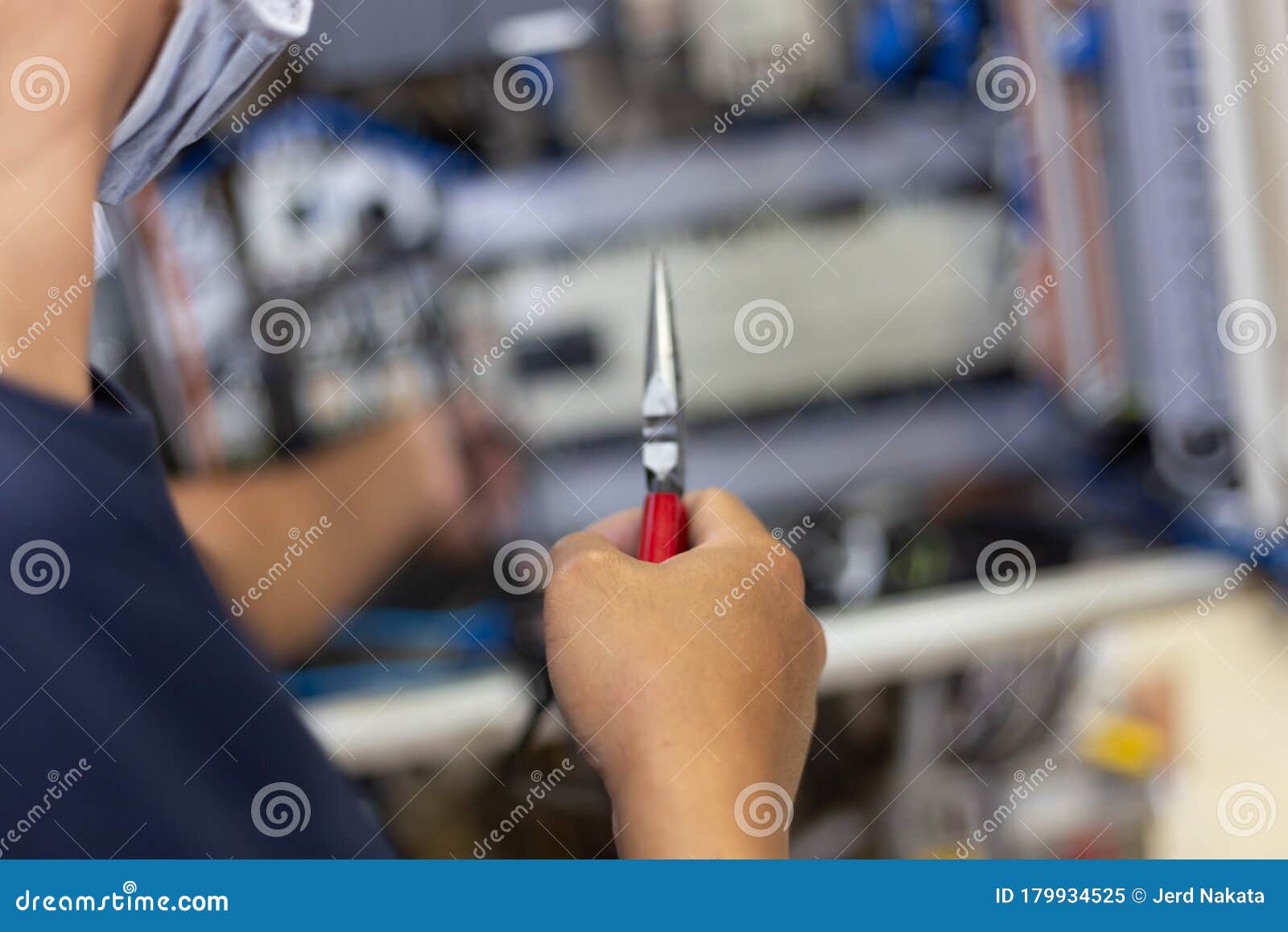 Technician Setting Electric Control Box of Machine in Factory Stock ...