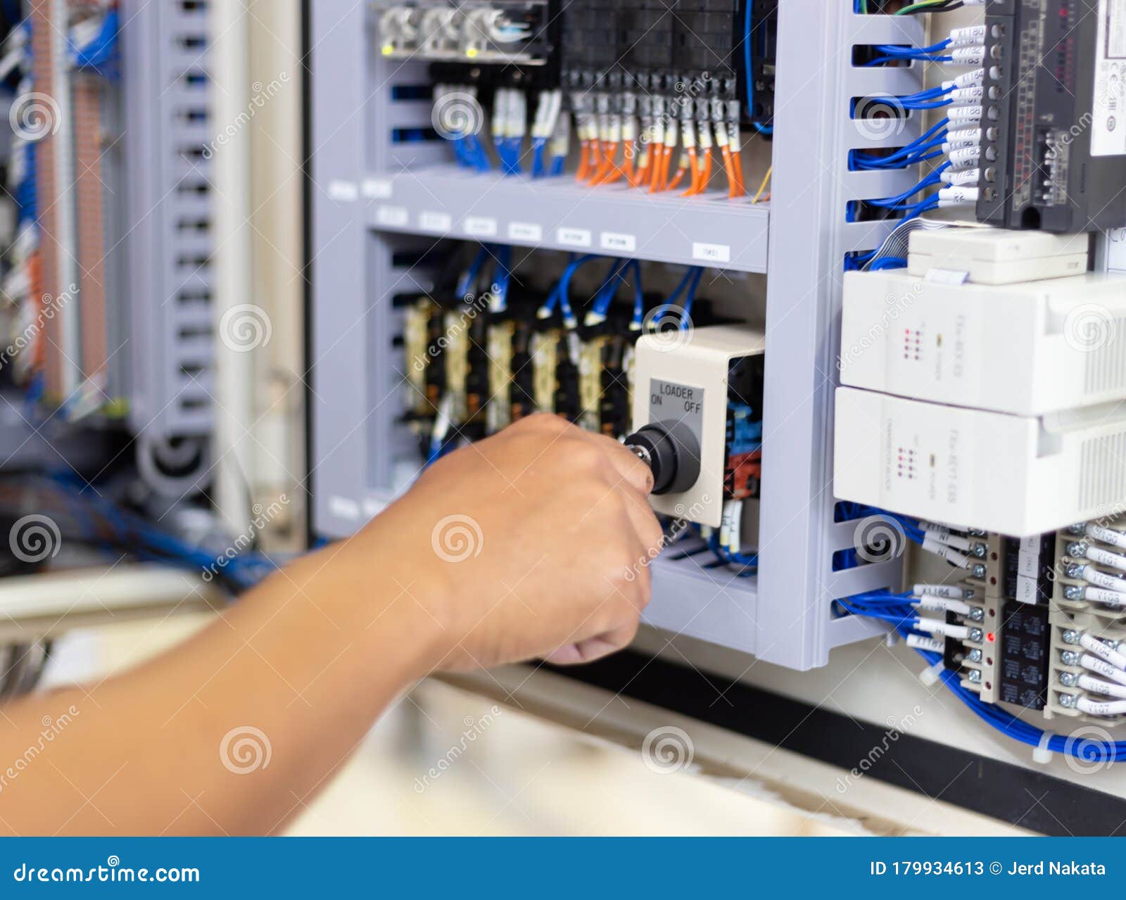 Technician Setting Electric Control Box of Machine in Factory Stock ...