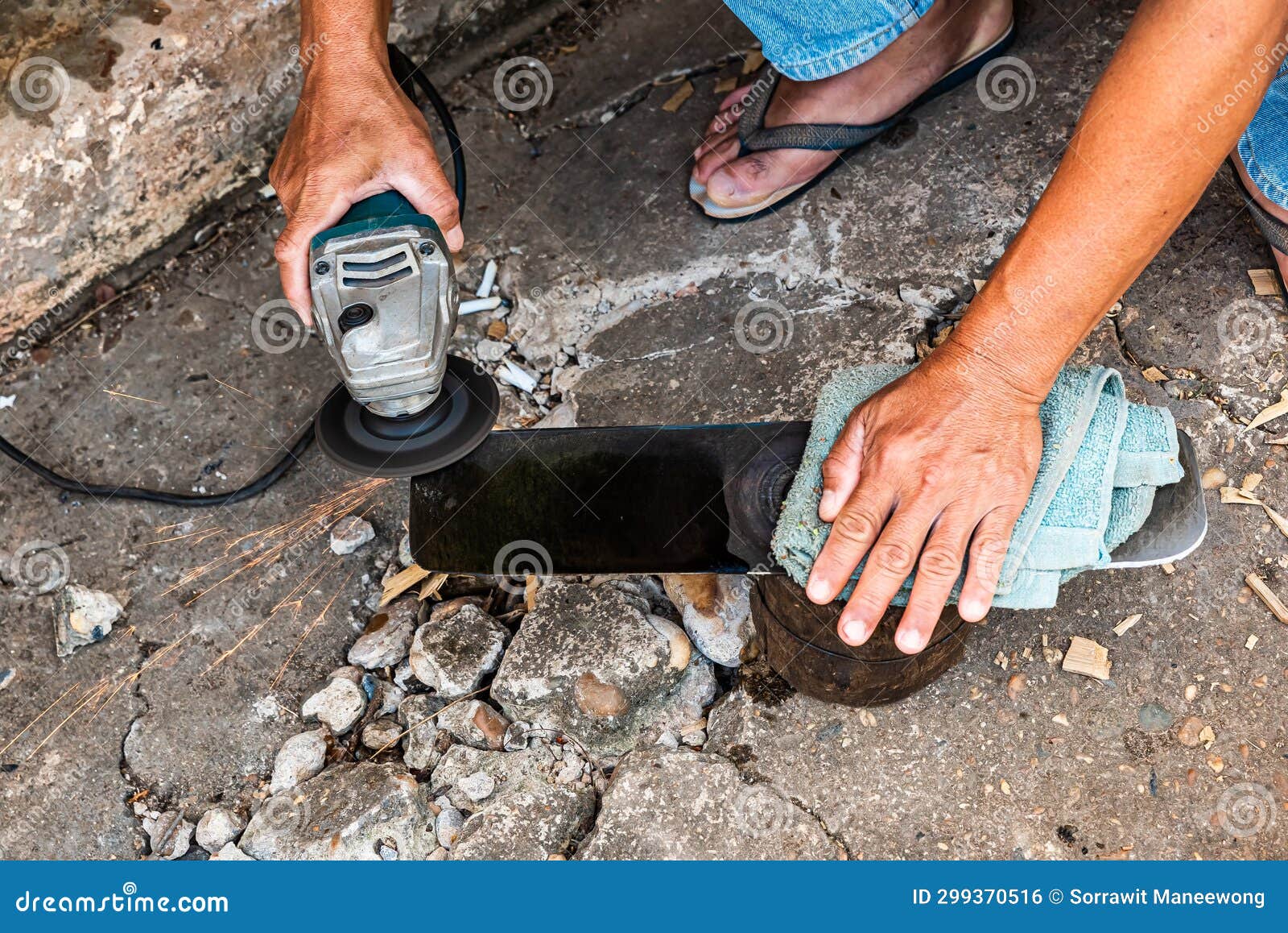 A Technician is Sharpening a Knife for Use in Construction Work Stock ...