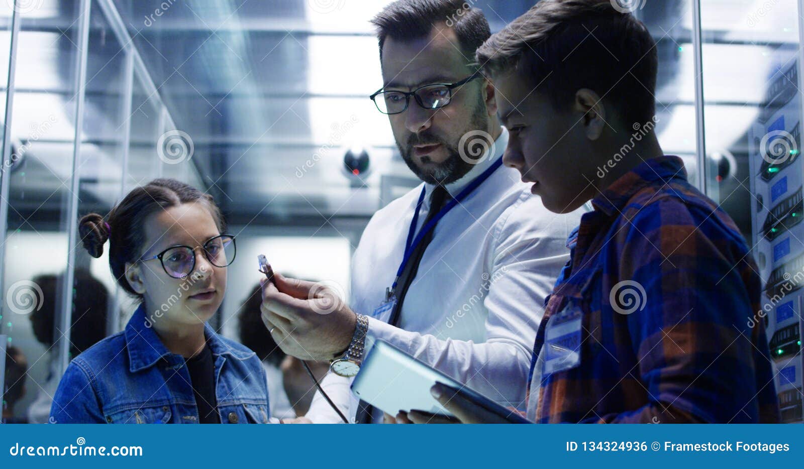 It Technician Showing Cable To Children Stock Photo - Image of corridor ...