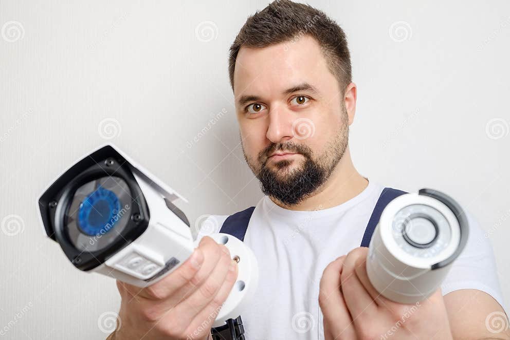 Technician Showing CCTV Security Cameras Stock Photo - Image of ...