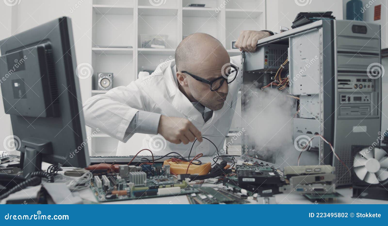Technician Damaging a Computer with a Screwdriver Stock Photo - Image ...