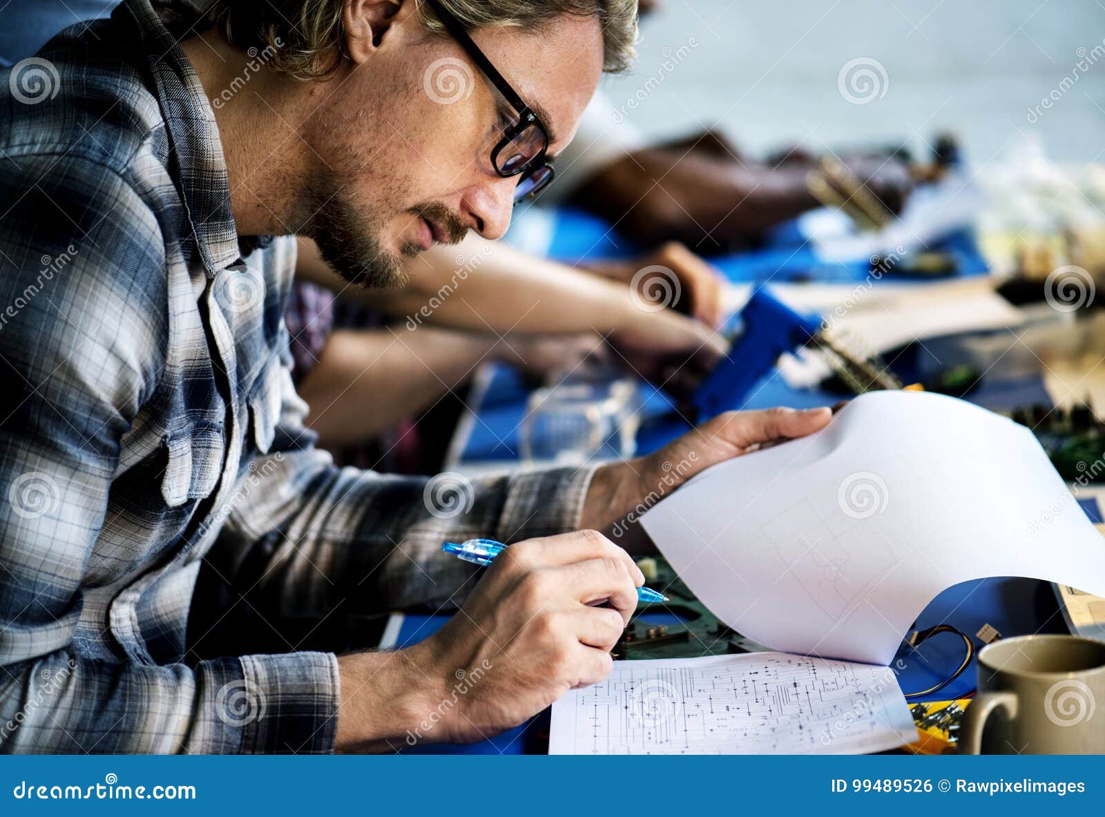 Technician is Study a Circuit Pattern Guide Line Paper Stock Photo ...