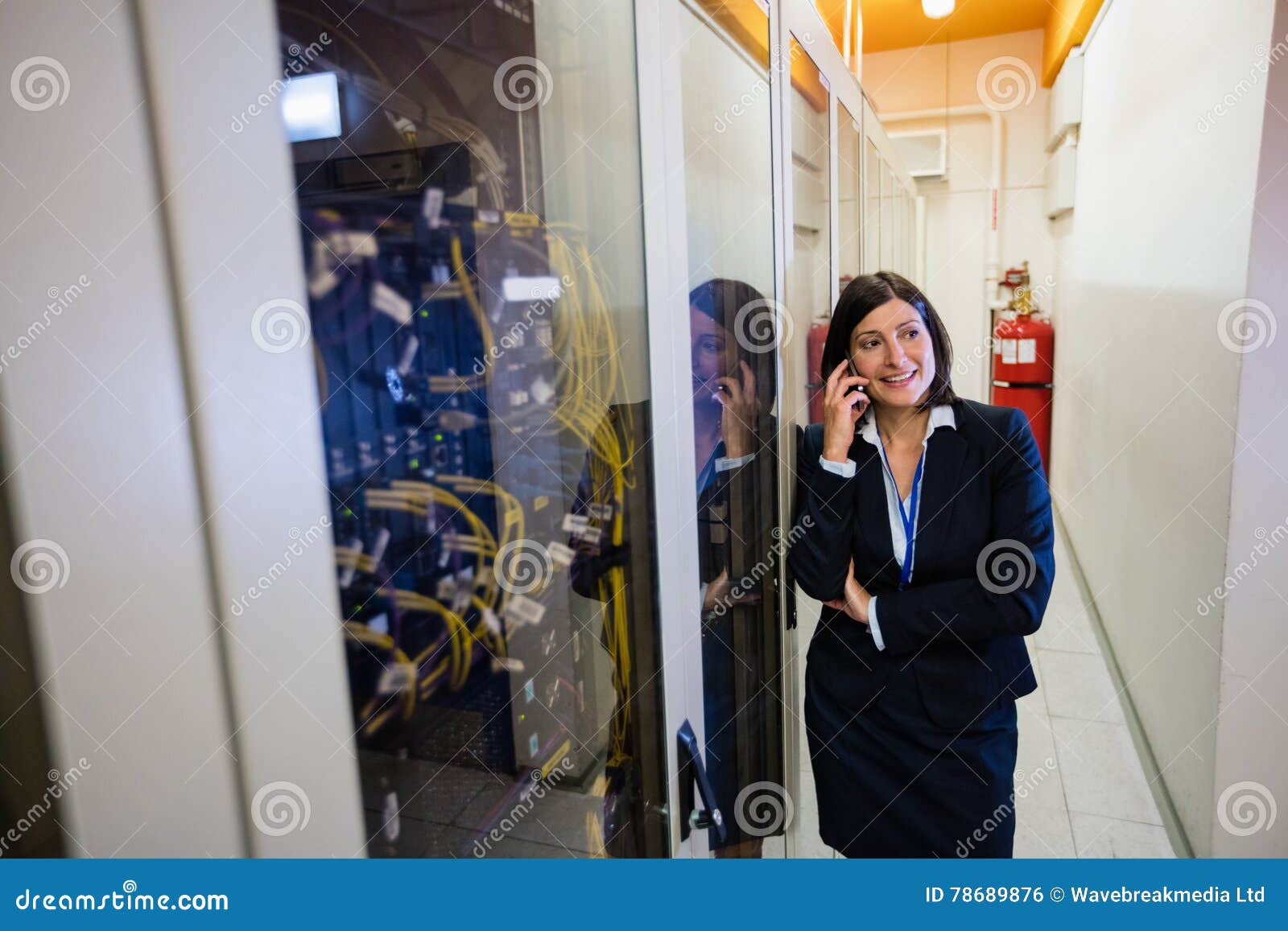Technician Talking on Mobile Phone Stock Photo - Image of discussion ...