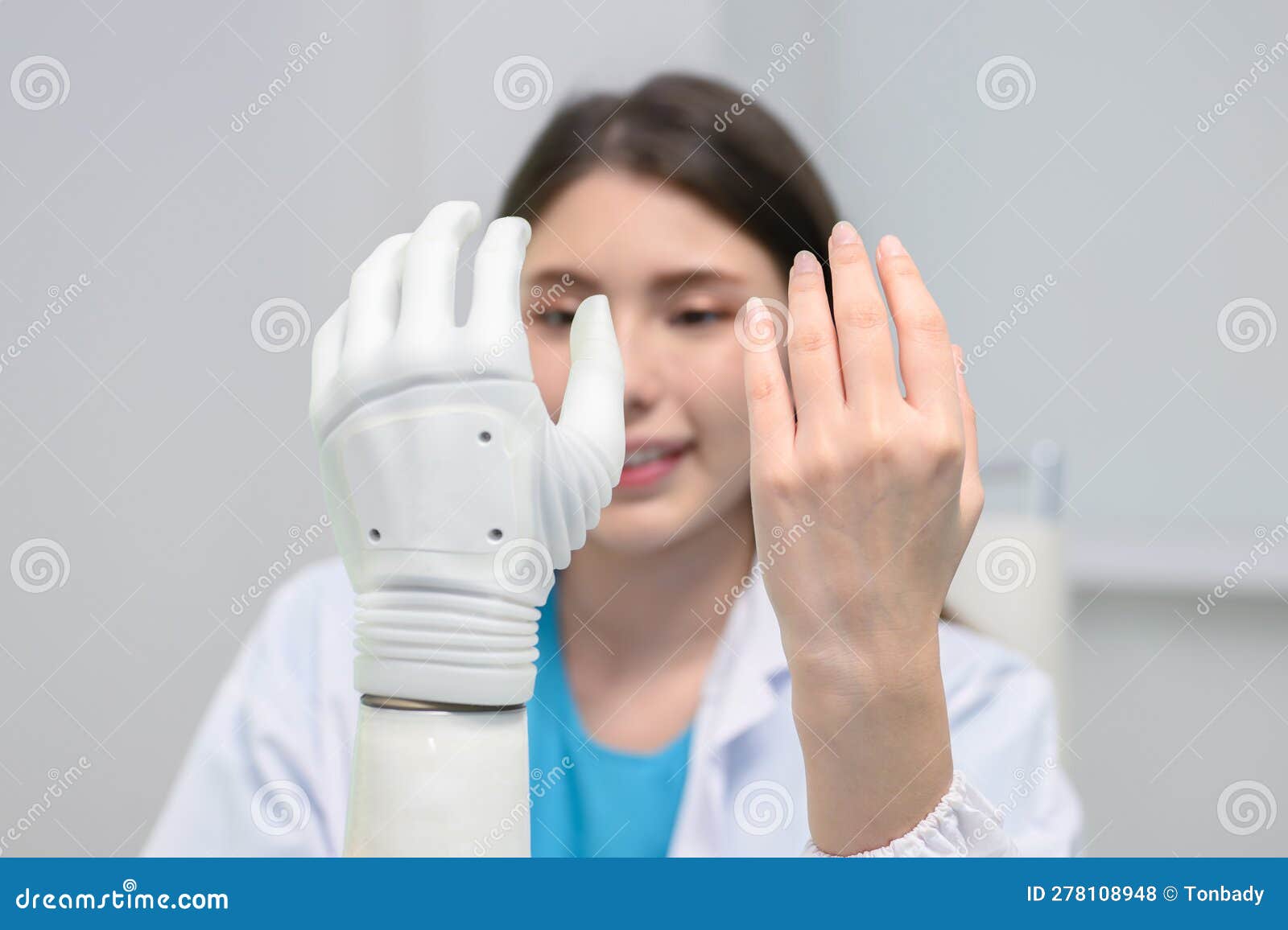 Technician Testing Robotic Bionic Arm at Prosthetic Manufacturing Stock ...