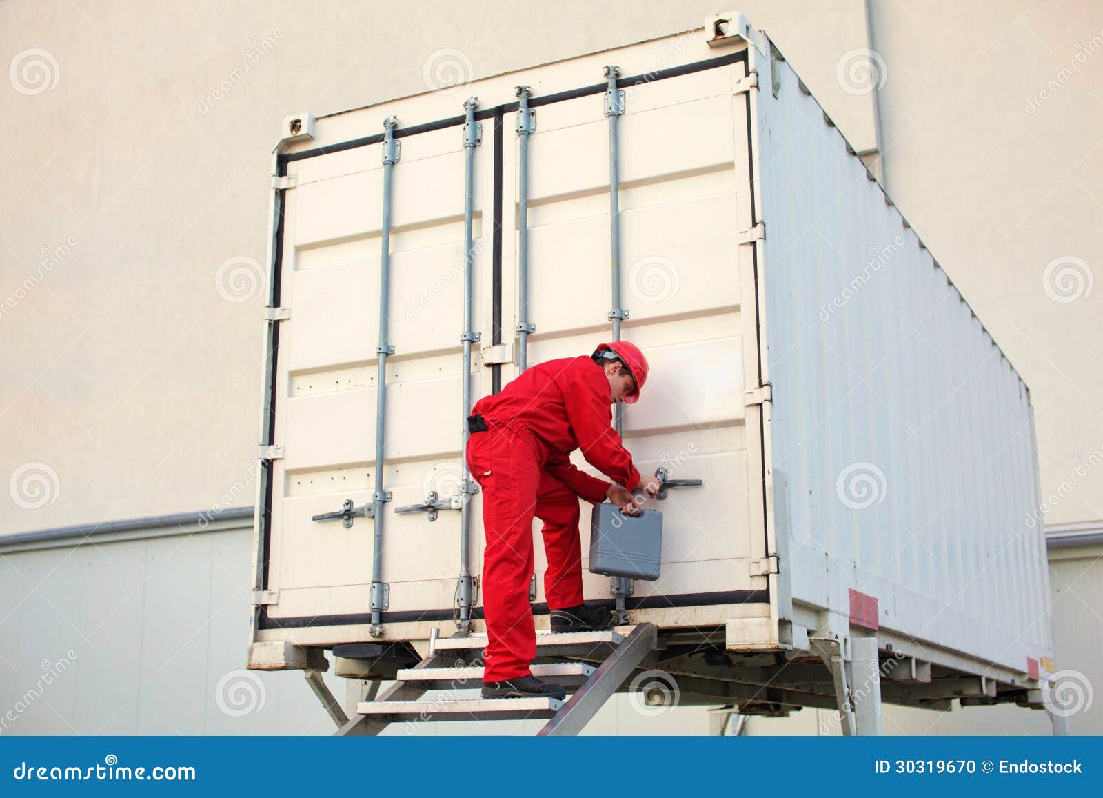 Technician with Tool Case Opening Movable Workshop in Container Stock ...
