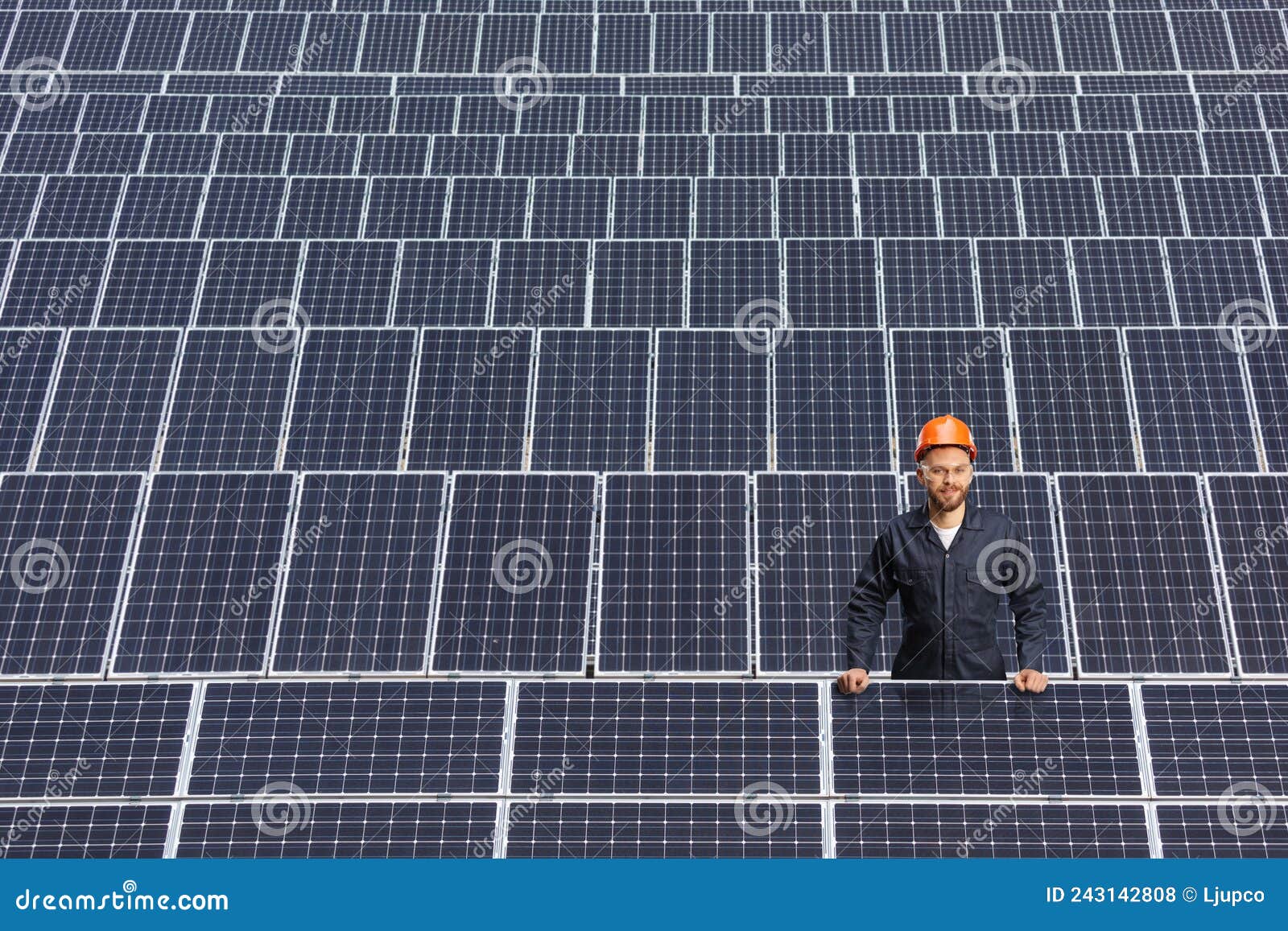 Technician in a Uniform Standing between Solar Panels Stock Photo ...