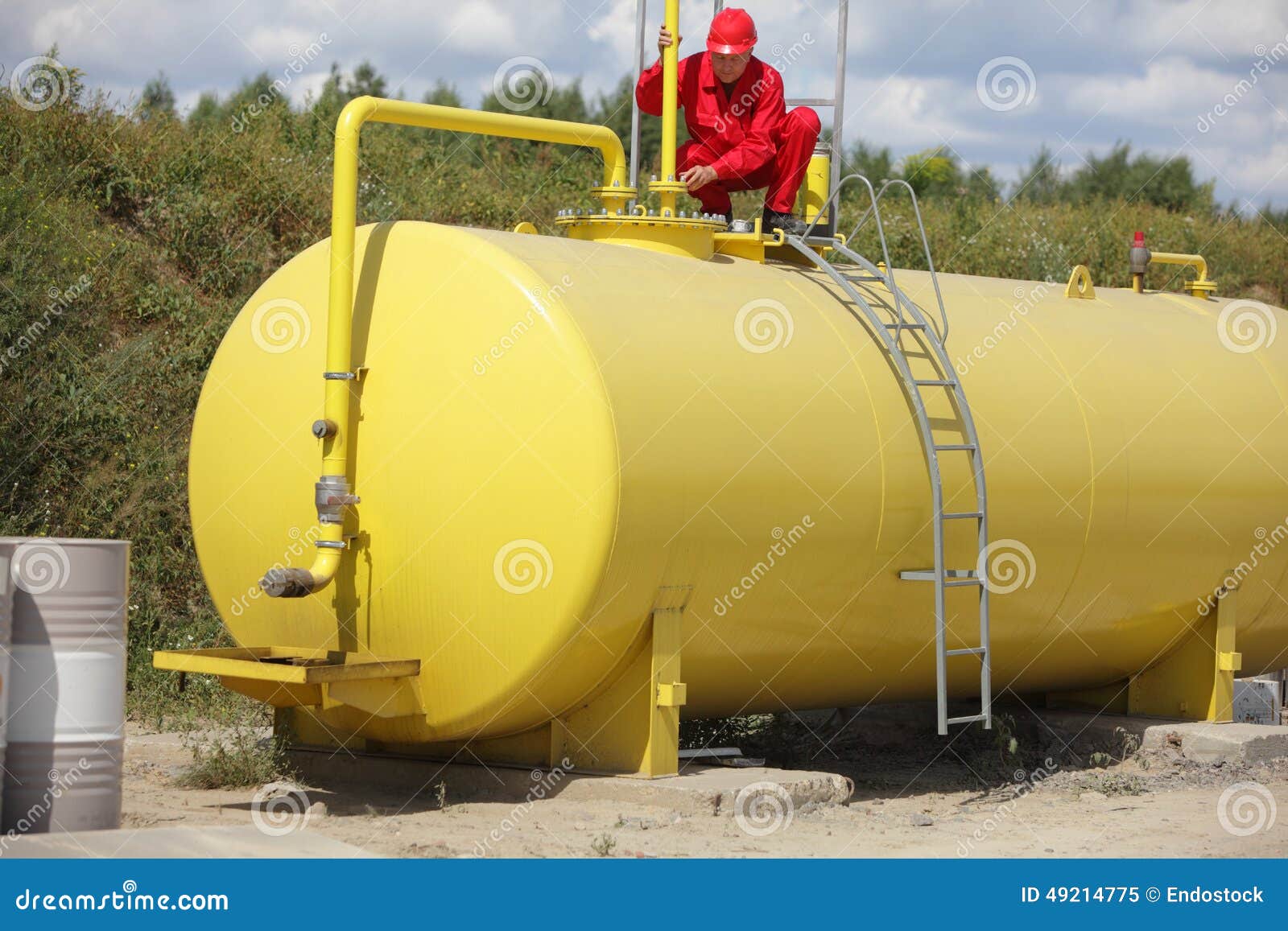 Technician in Uniform Working on Large Fuel Tank Stock Image - Image of ...