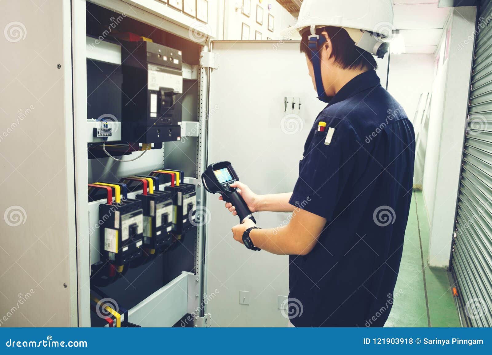 Technician Use Thermal Imaging Camera To Check Temperature in Fa Stock ...