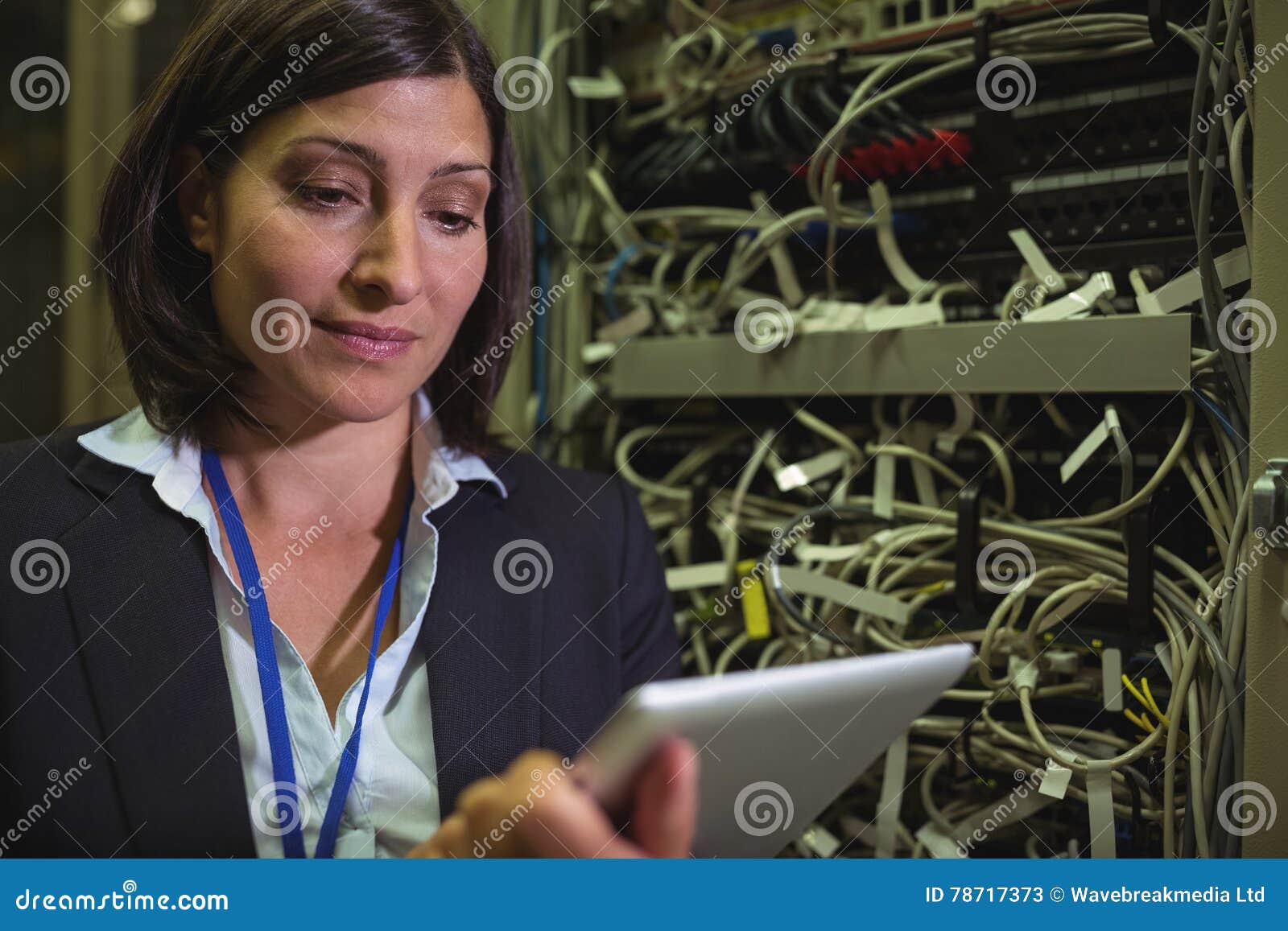 Technician Using Digital Tablet while Analyzing Server Stock Image ...