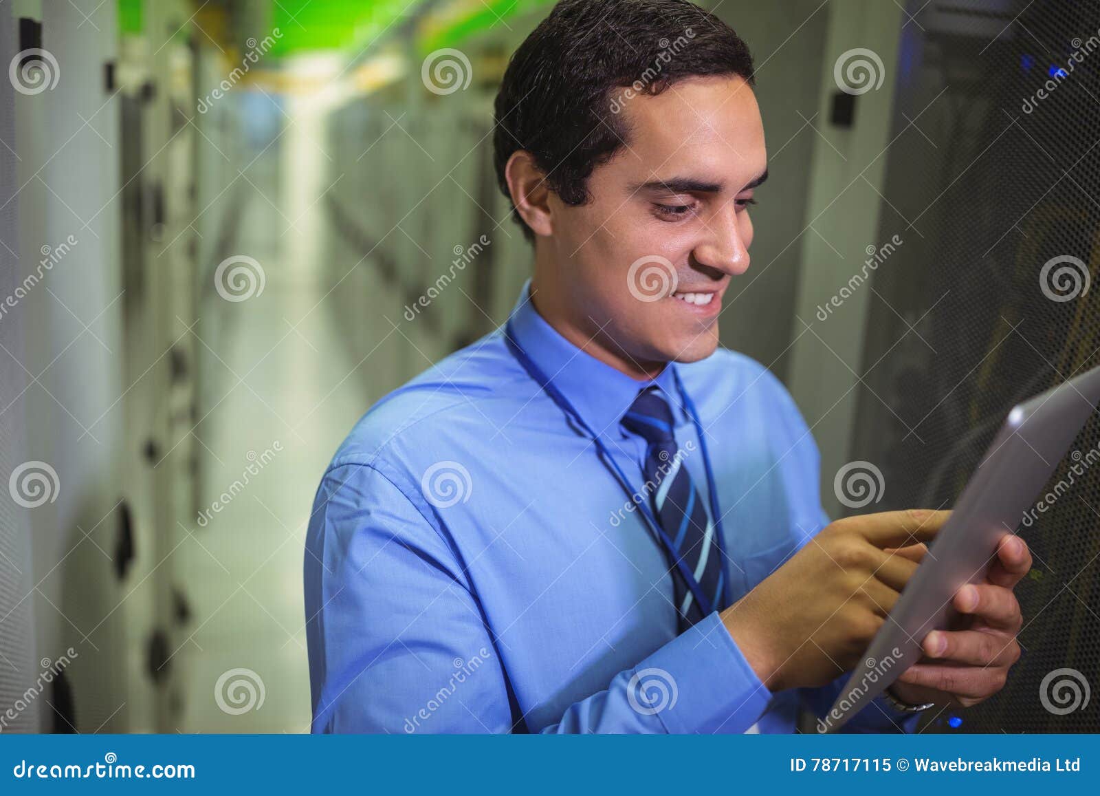 Technician Using Digital Tablet in Hallway Stock Image - Image of ...
