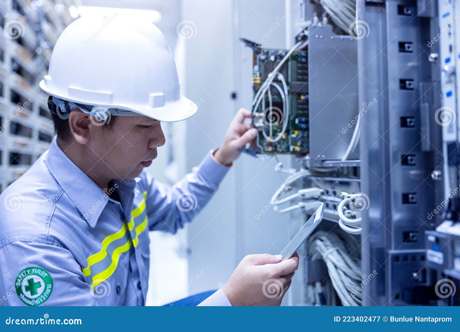 Technician Using Digital Tablet in Server Room, Repair Card Mainboard ...
