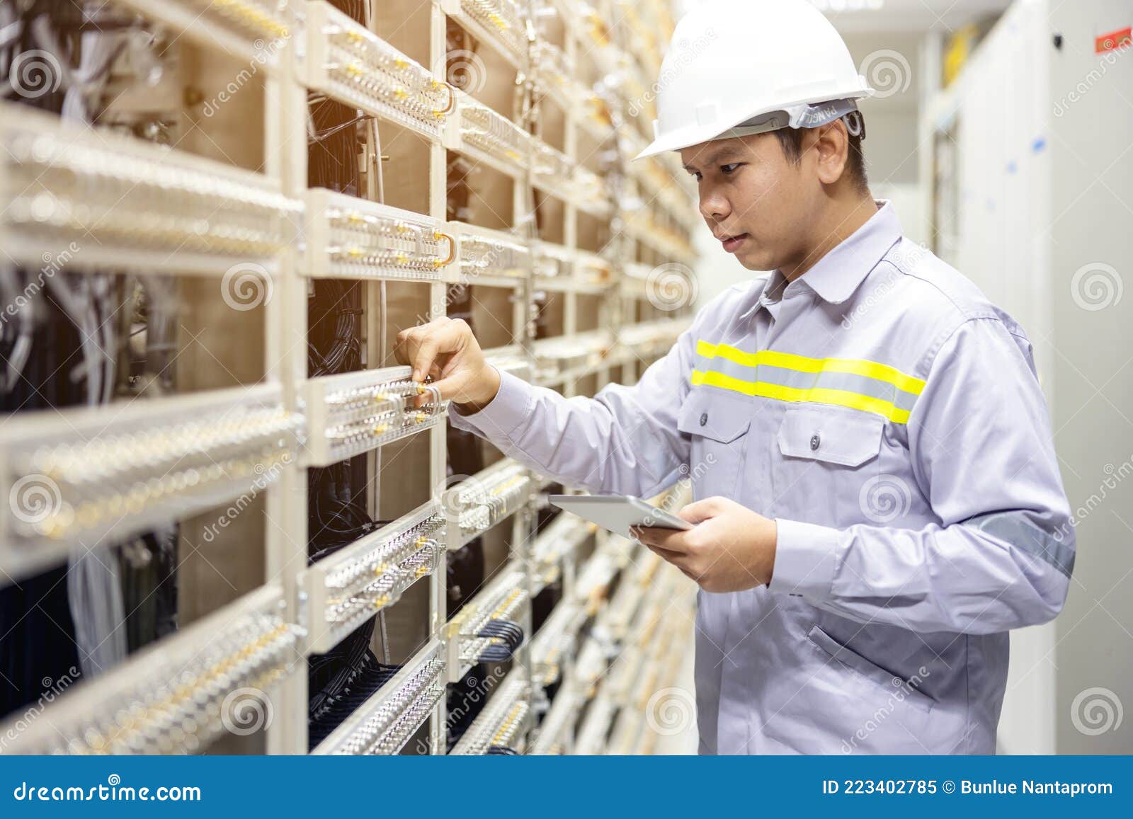 Technician Using Digital Tablet in Server Room, Repair Card Mainboard ...