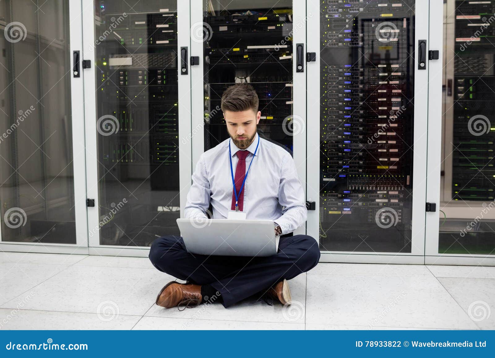 Technician using laptop stock photo. Image of center - 78933822