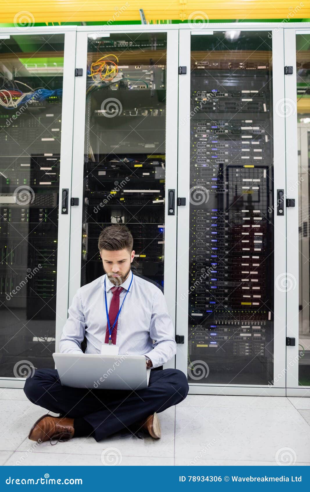 Technician using laptop stock photo. Image of examining - 78934306