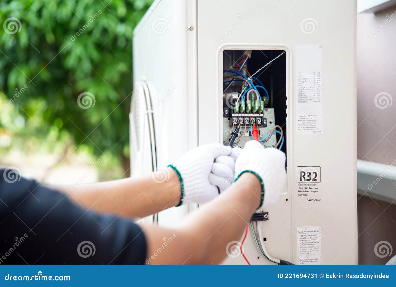 Technician Using Measuring Equipment Checking Electric At Circuit ...