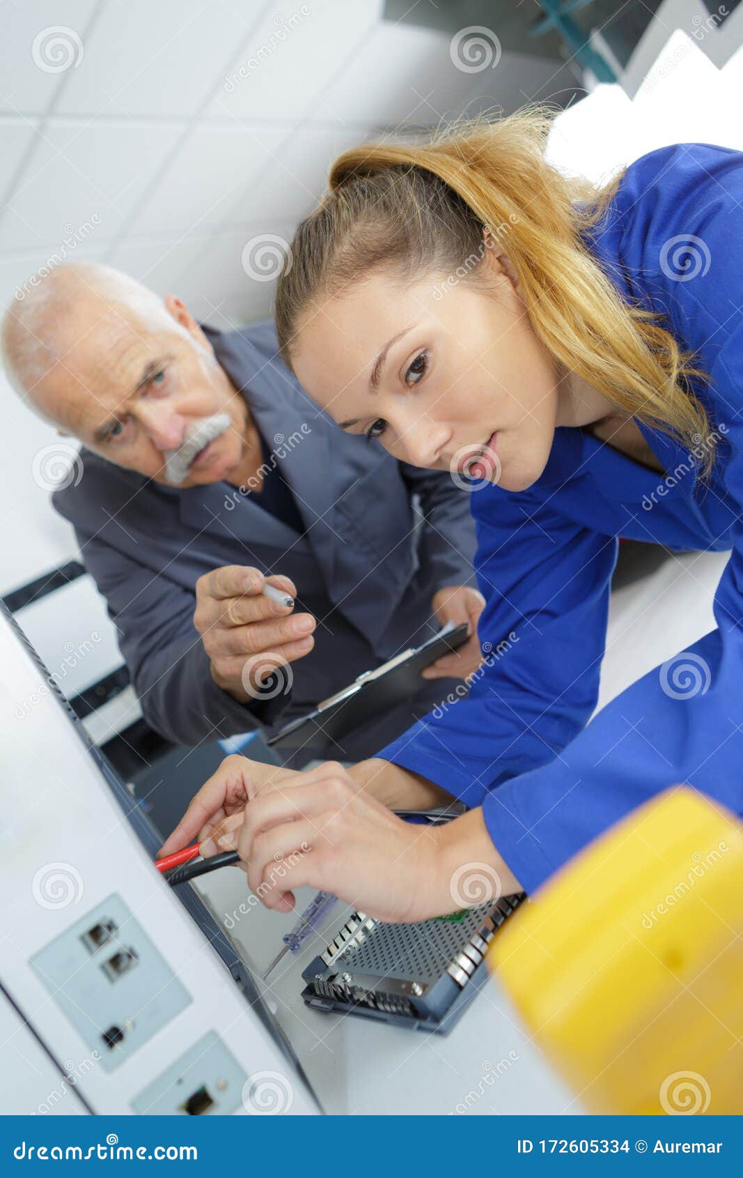 Technician Using Multimeter To Test Appliance Stock Photo - Image of ...