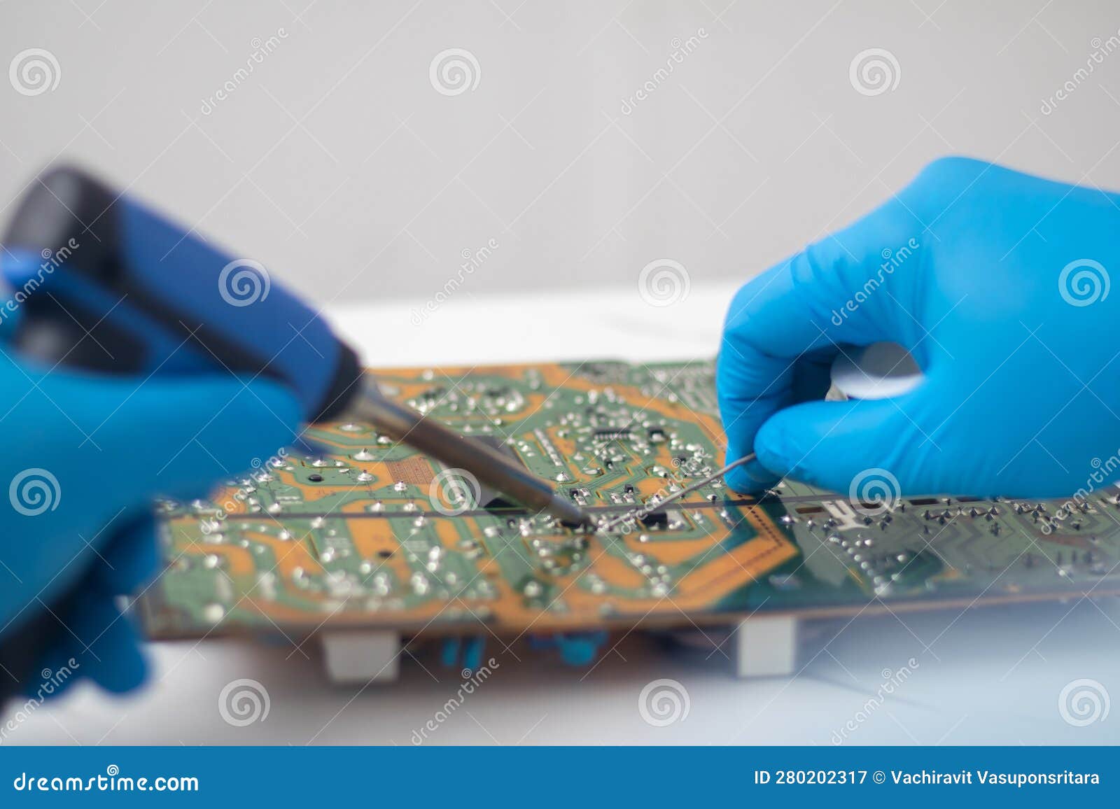 Technician Using a Soldering Iron To Repair a Circuit Board Stock Image ...