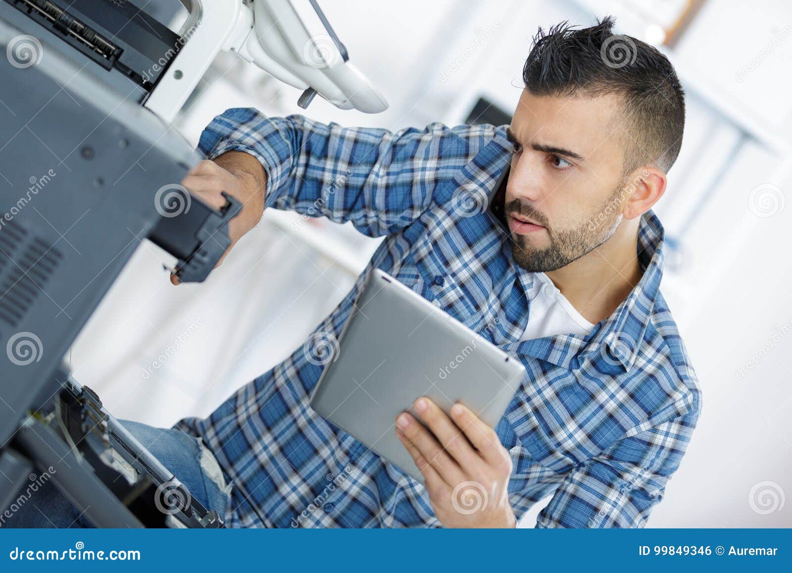 Technician Using Tablet To Fix Printer Stock Photo - Image of ...