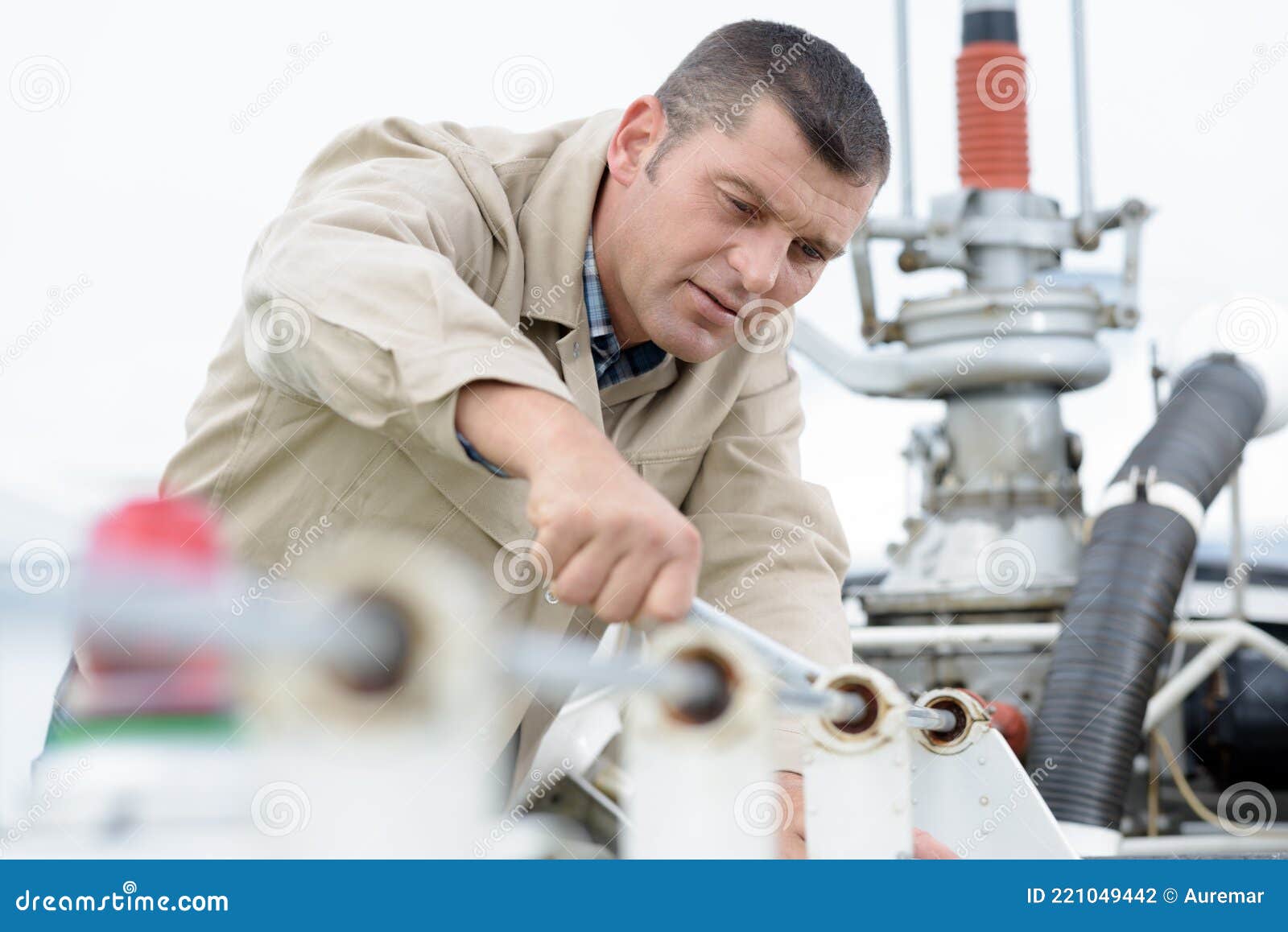Technician Using Tool To Adjust Shaft Stock Photo - Image of worker ...