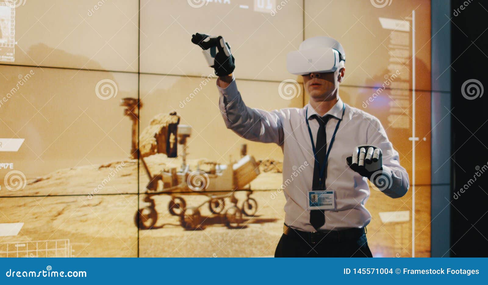 Technician Using VR Headset and Exoskeleton Gloves Stock Photo - Image ...