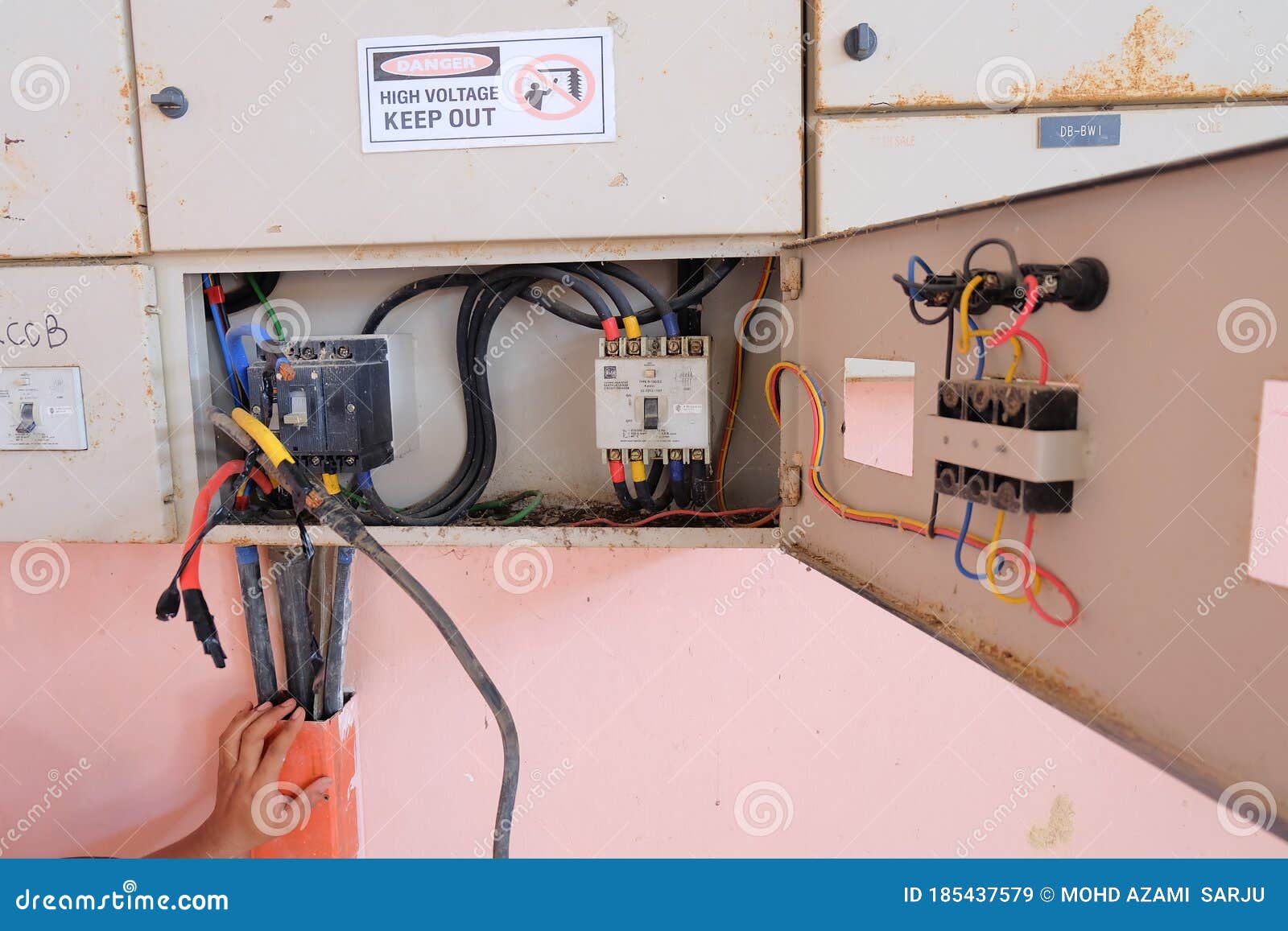 Technician Wiring Cable in Front of Electrical Panel Stock Image ...
