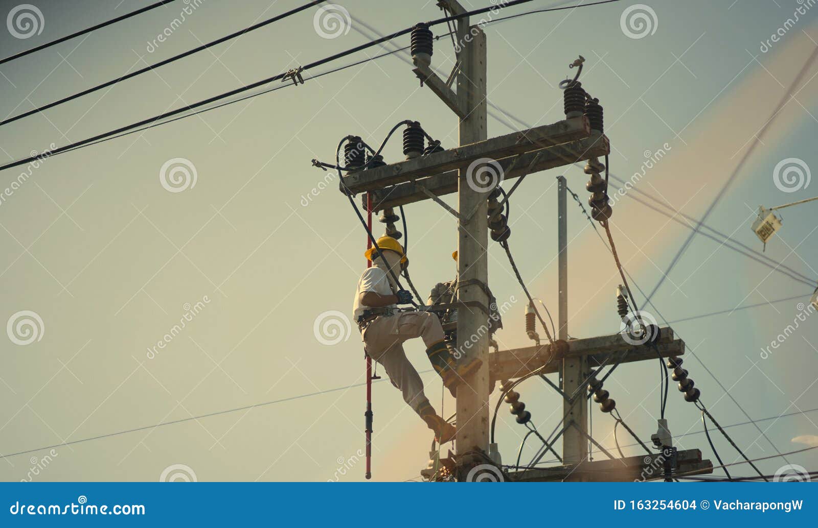 Technician Work on High Voltage Electic Pole with Copy Space Stock ...