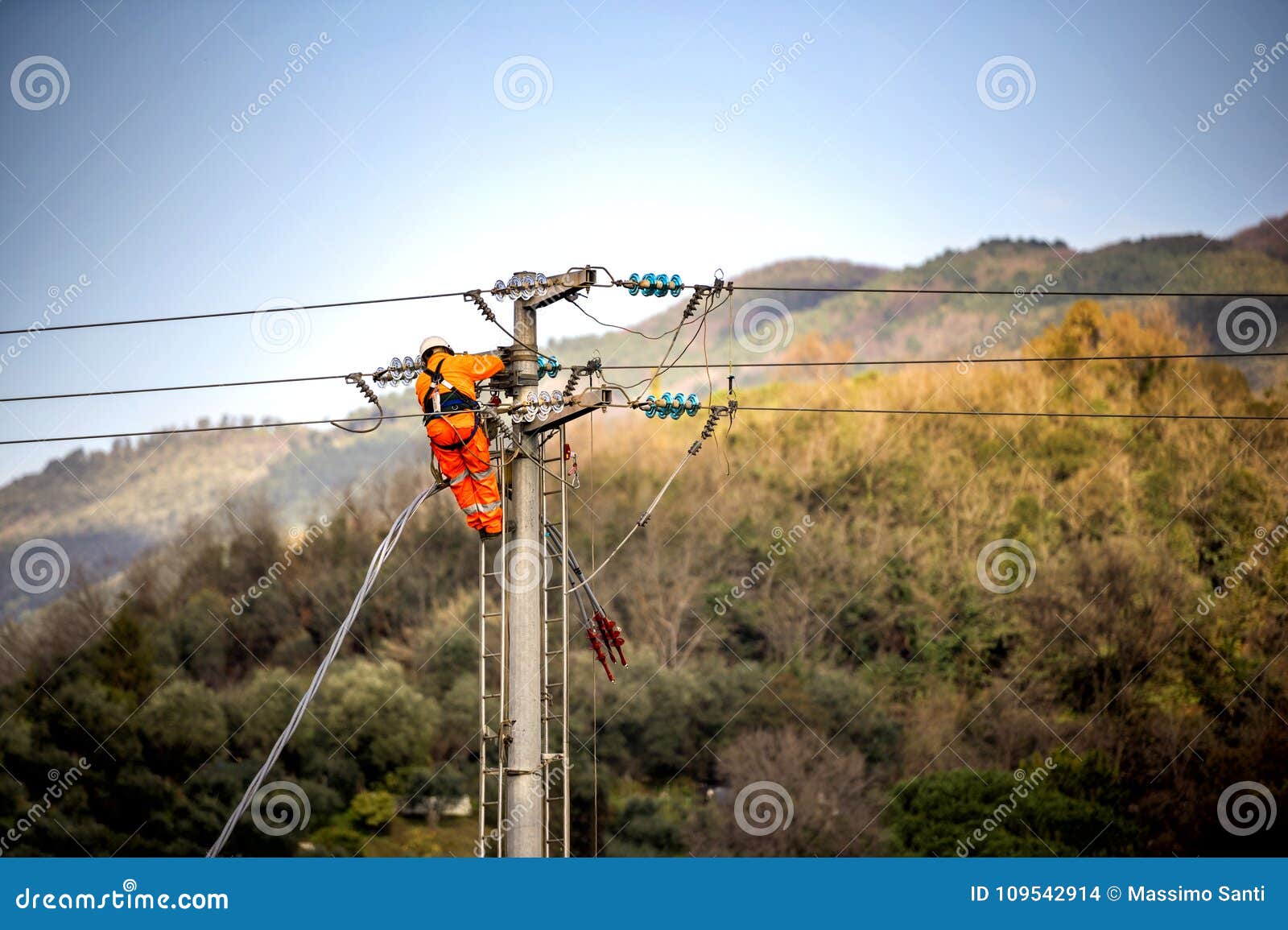 Man at Work. Technician are Repairing High Voltage Transmission Systems ...