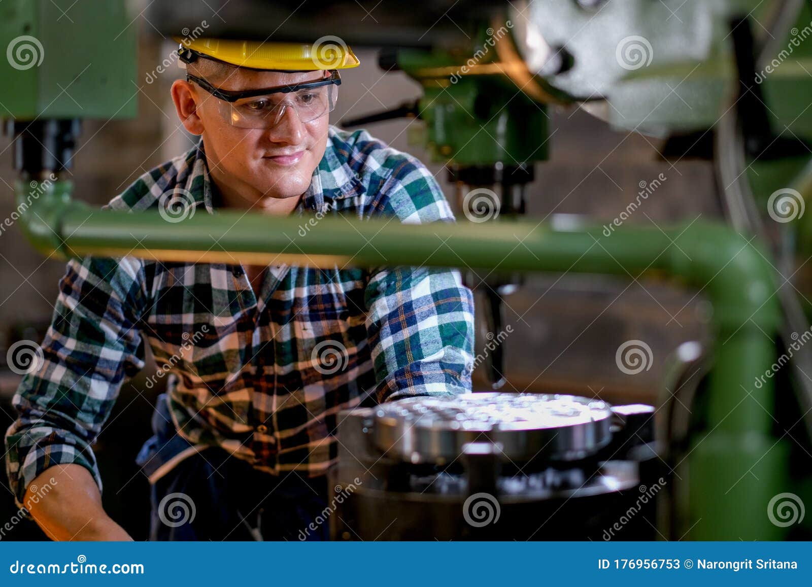 Technician or Worker Man Work with the Machine in Factory with Day ...